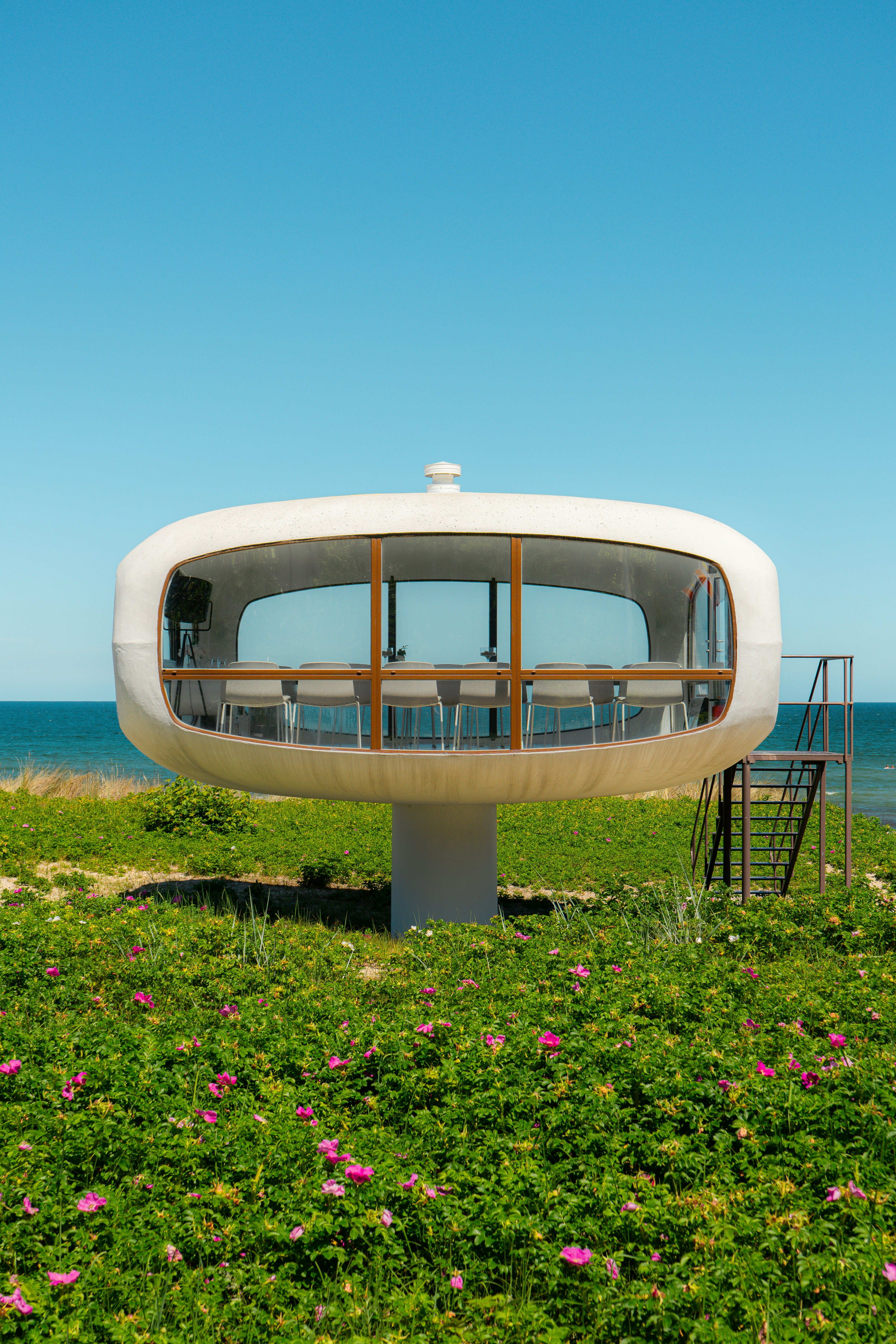 Portico by the Sea: Futuristic Viewing Capsule in Bloom