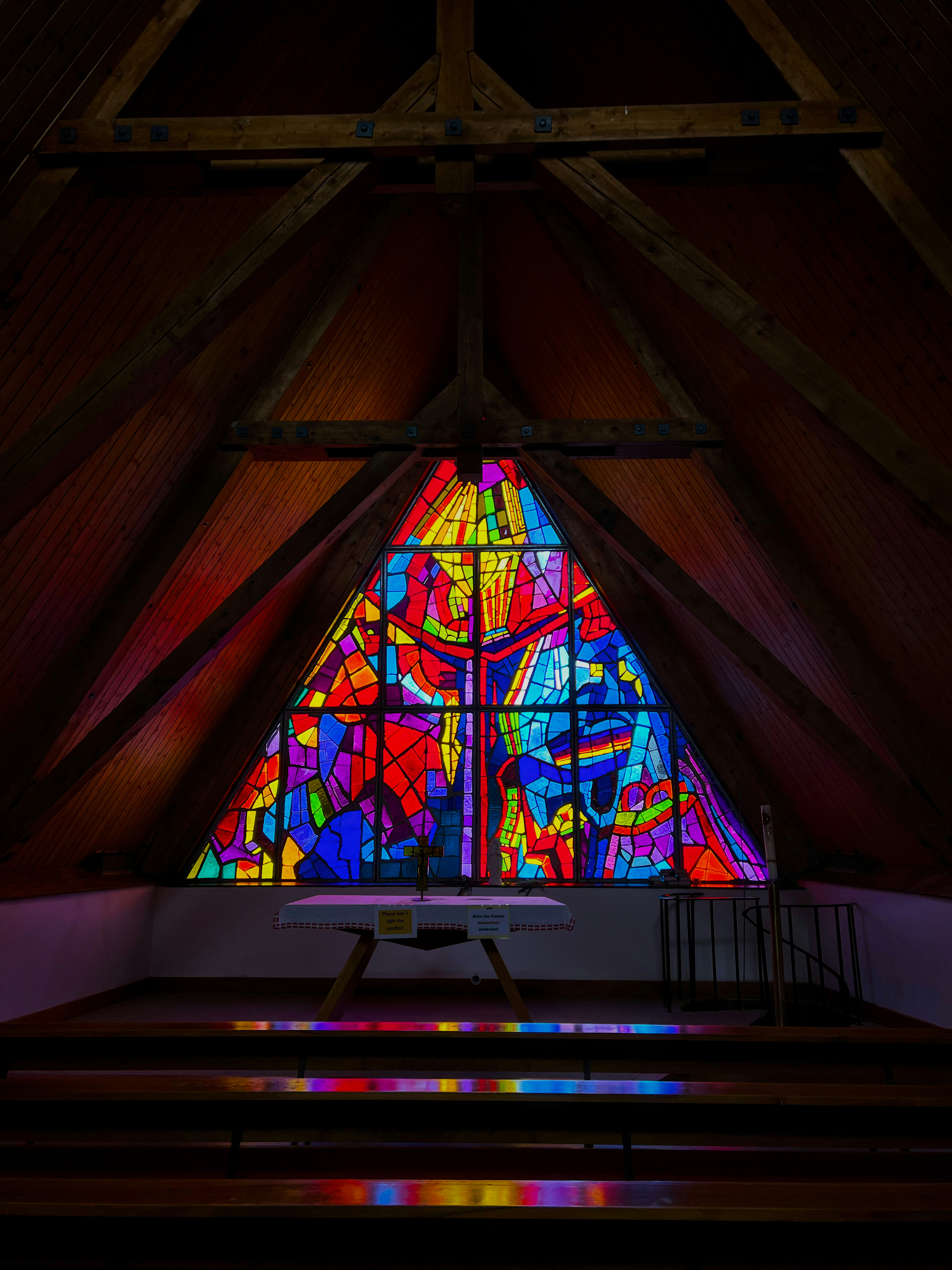 Stained light in a quiet chapel