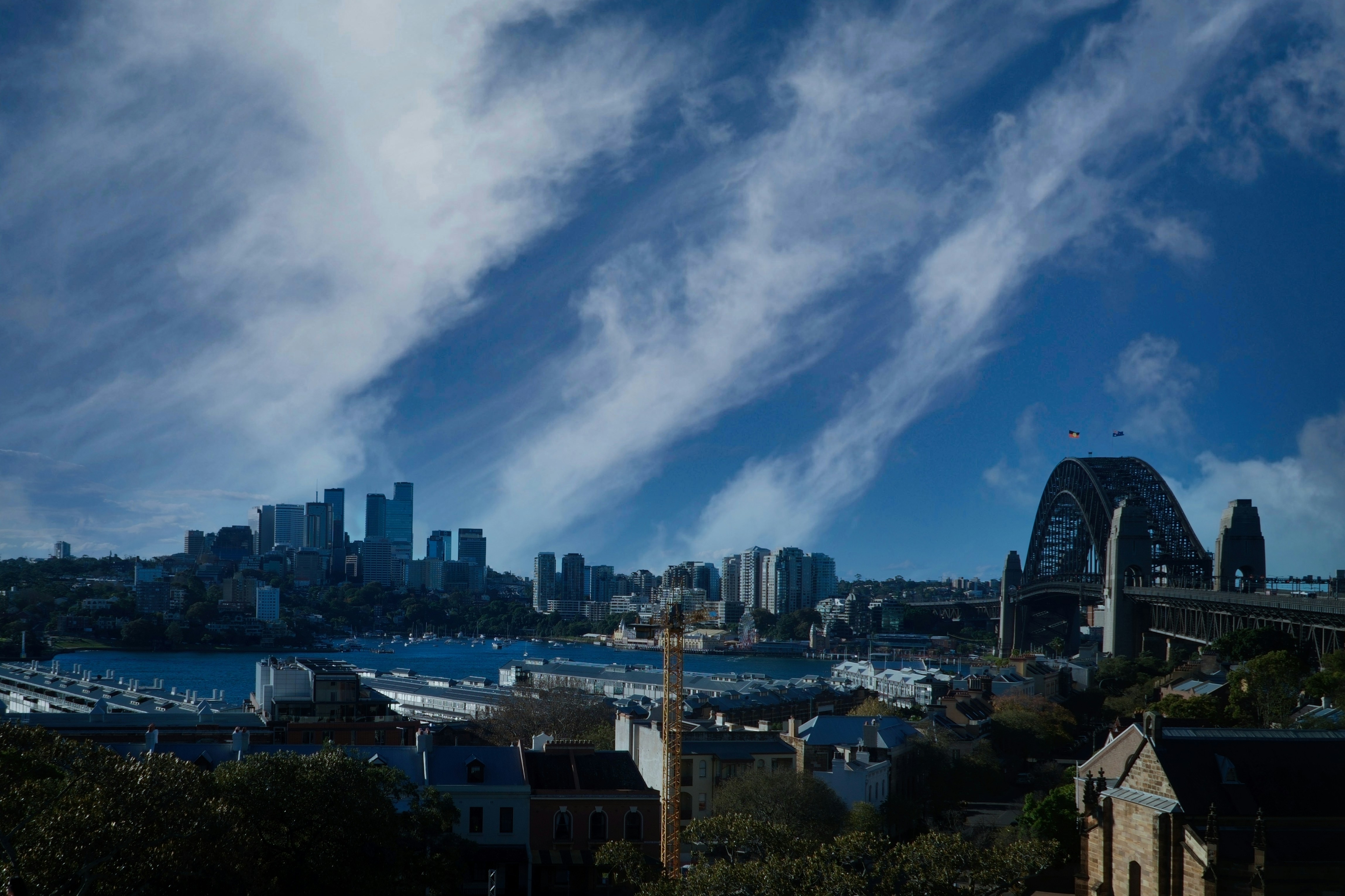 Harbor Skyline Under a Wide Blue Arc