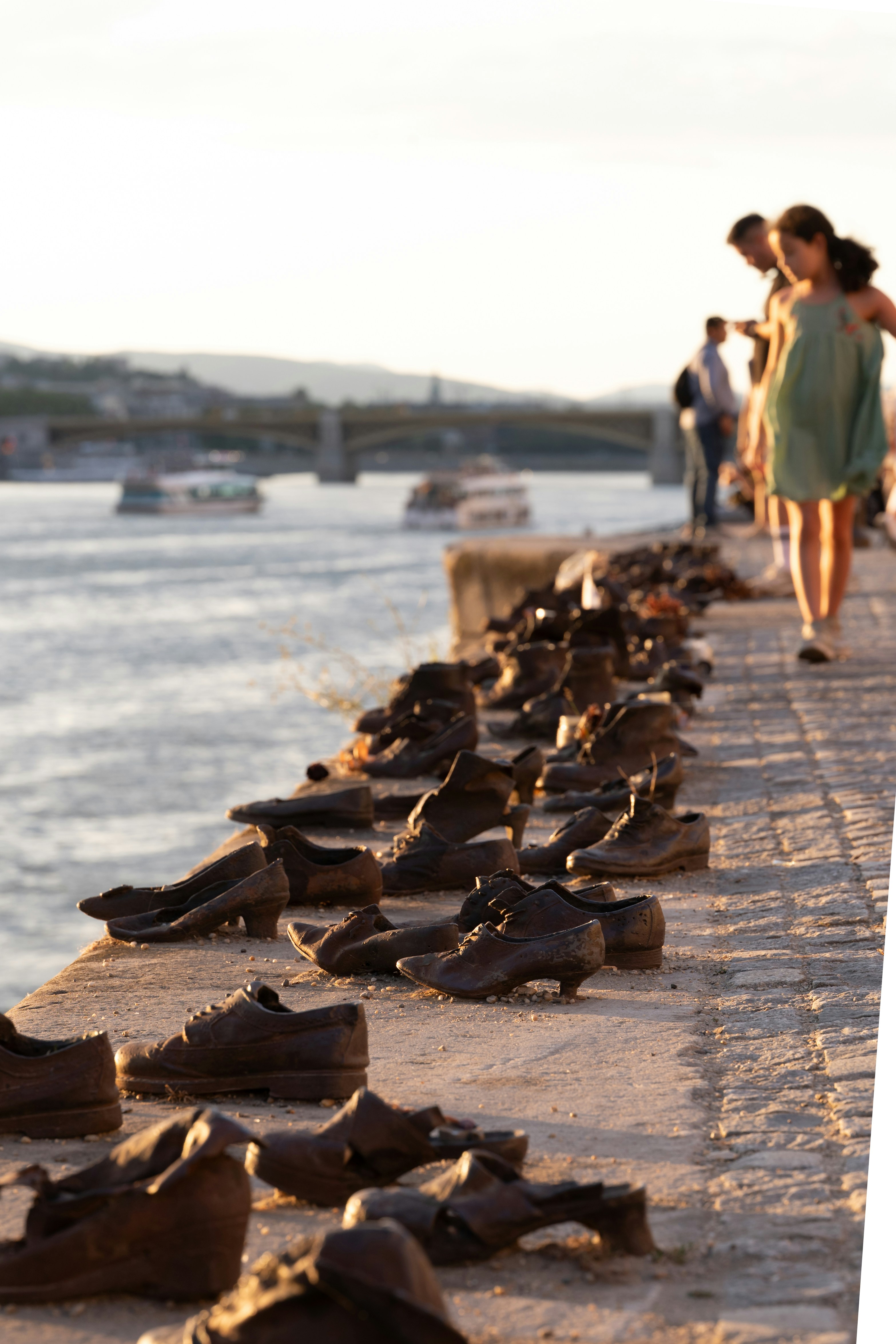 Shoes on the Edge: A Quiet Pierline of Departed Steps