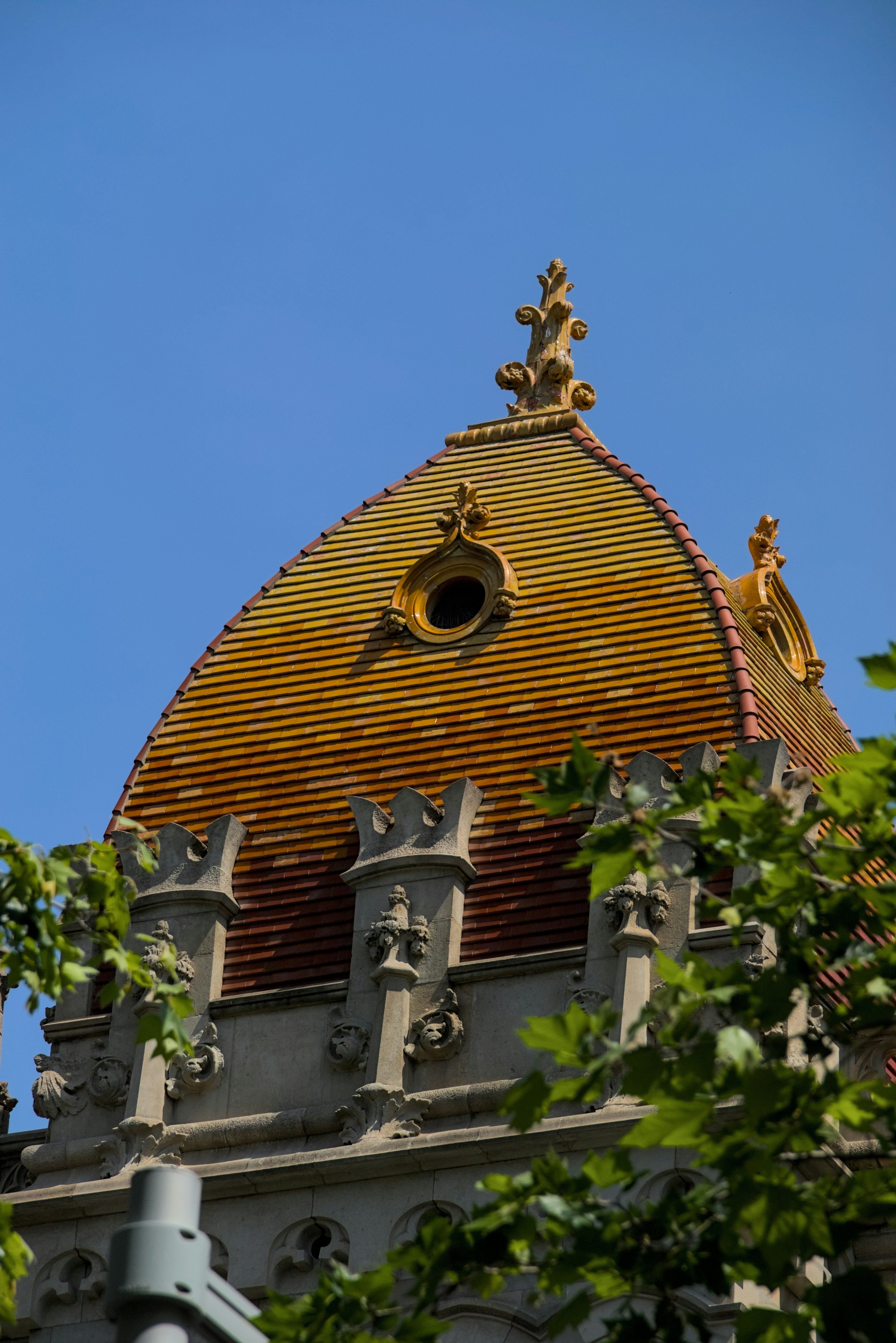 Clay tile dome under a clear blue sky