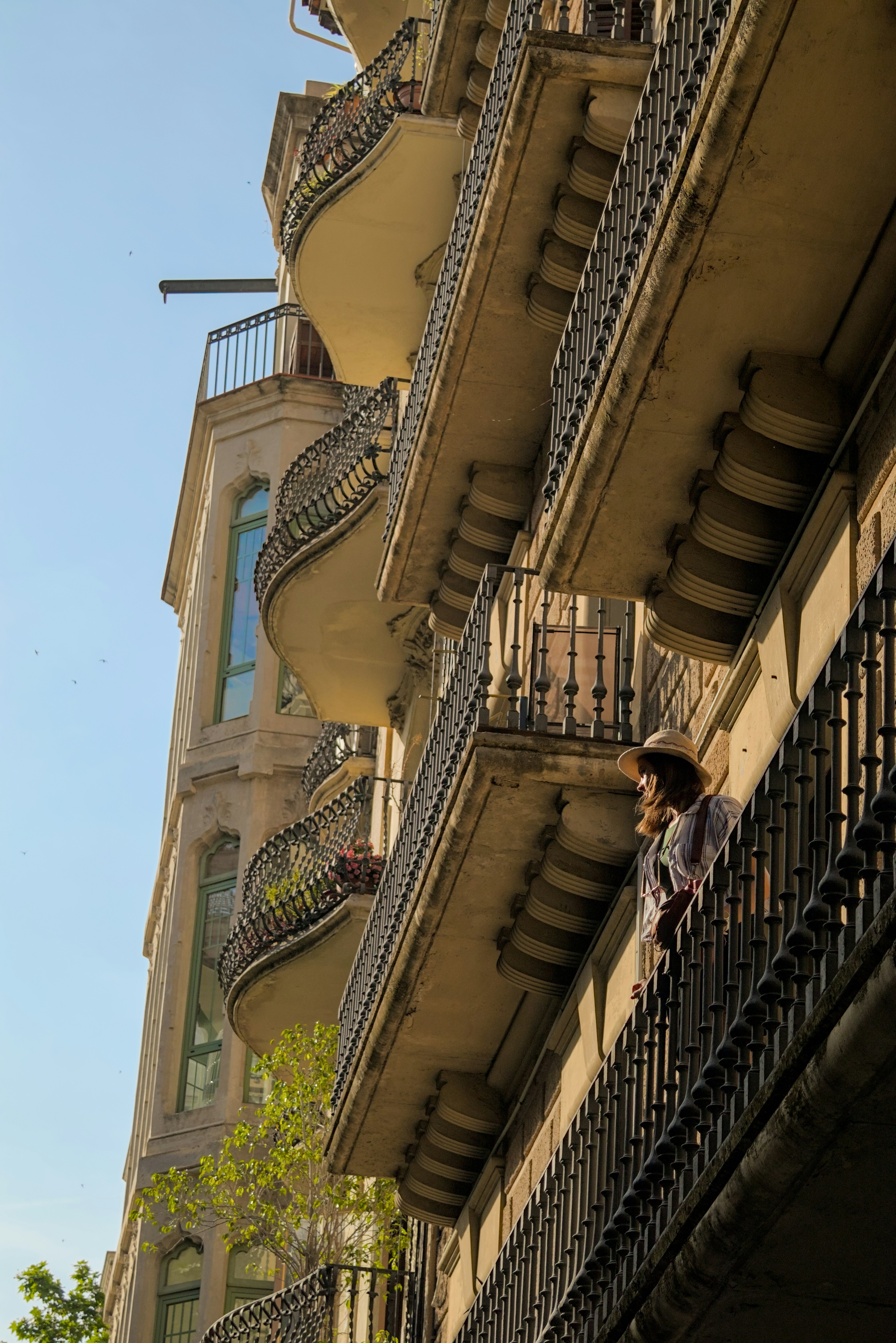 Balcony Observer: A Woman on the Edge of Architecture