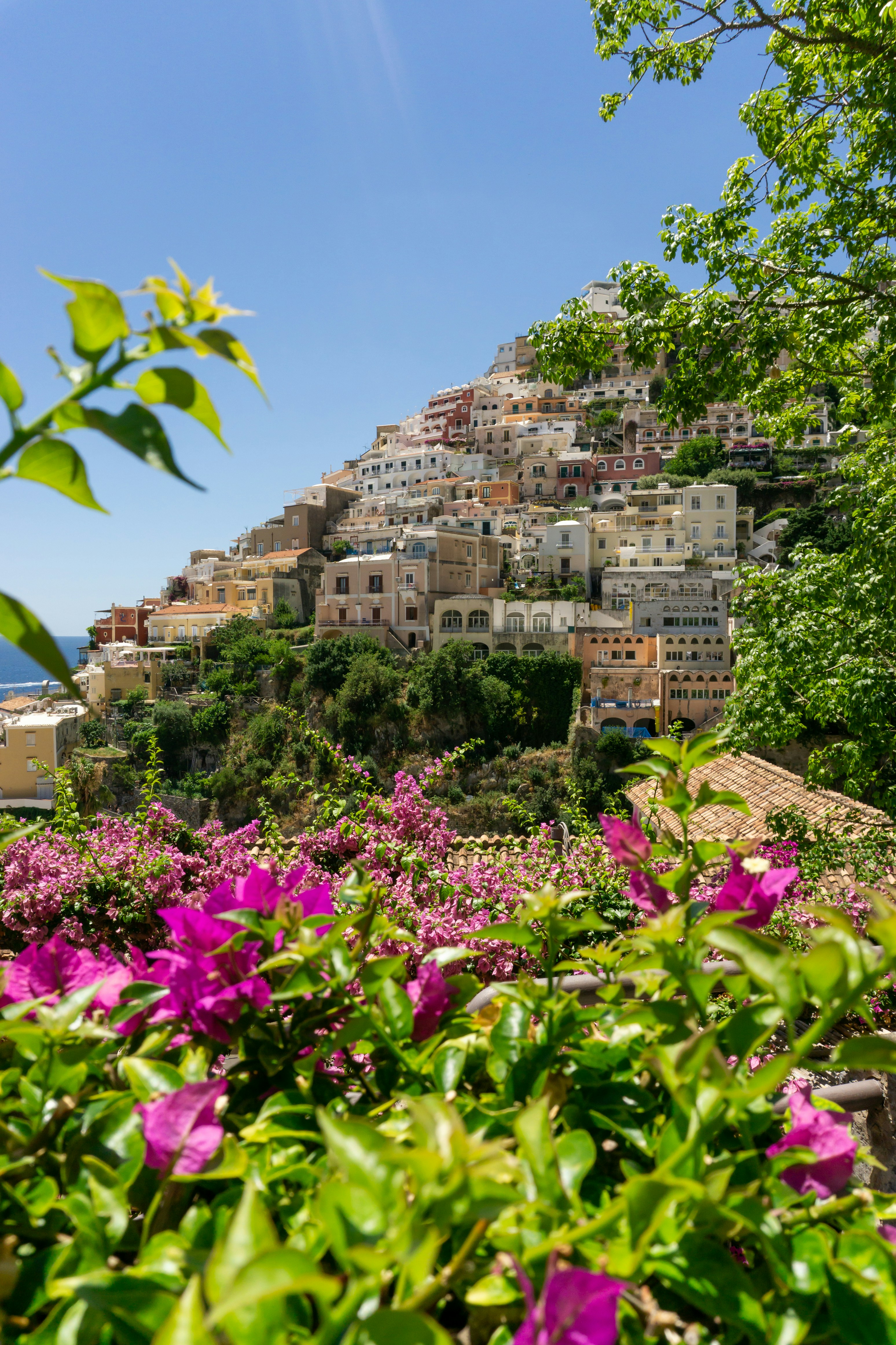 Hilltop Village Cascade: Colorful Houses Cling to the Olive-Scented Cliffs