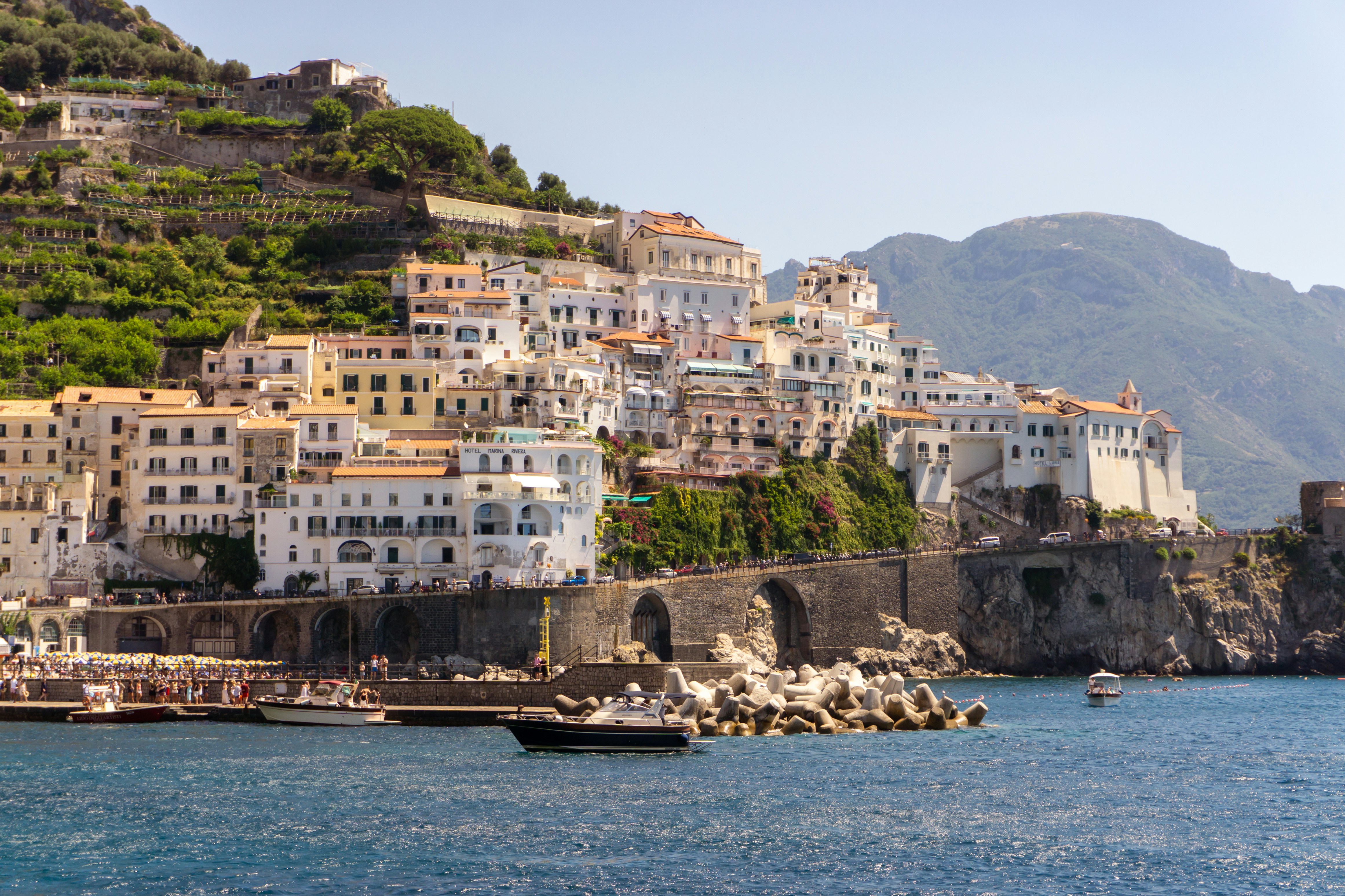 Harbor Village: Cliffside White Facades Over Aegean