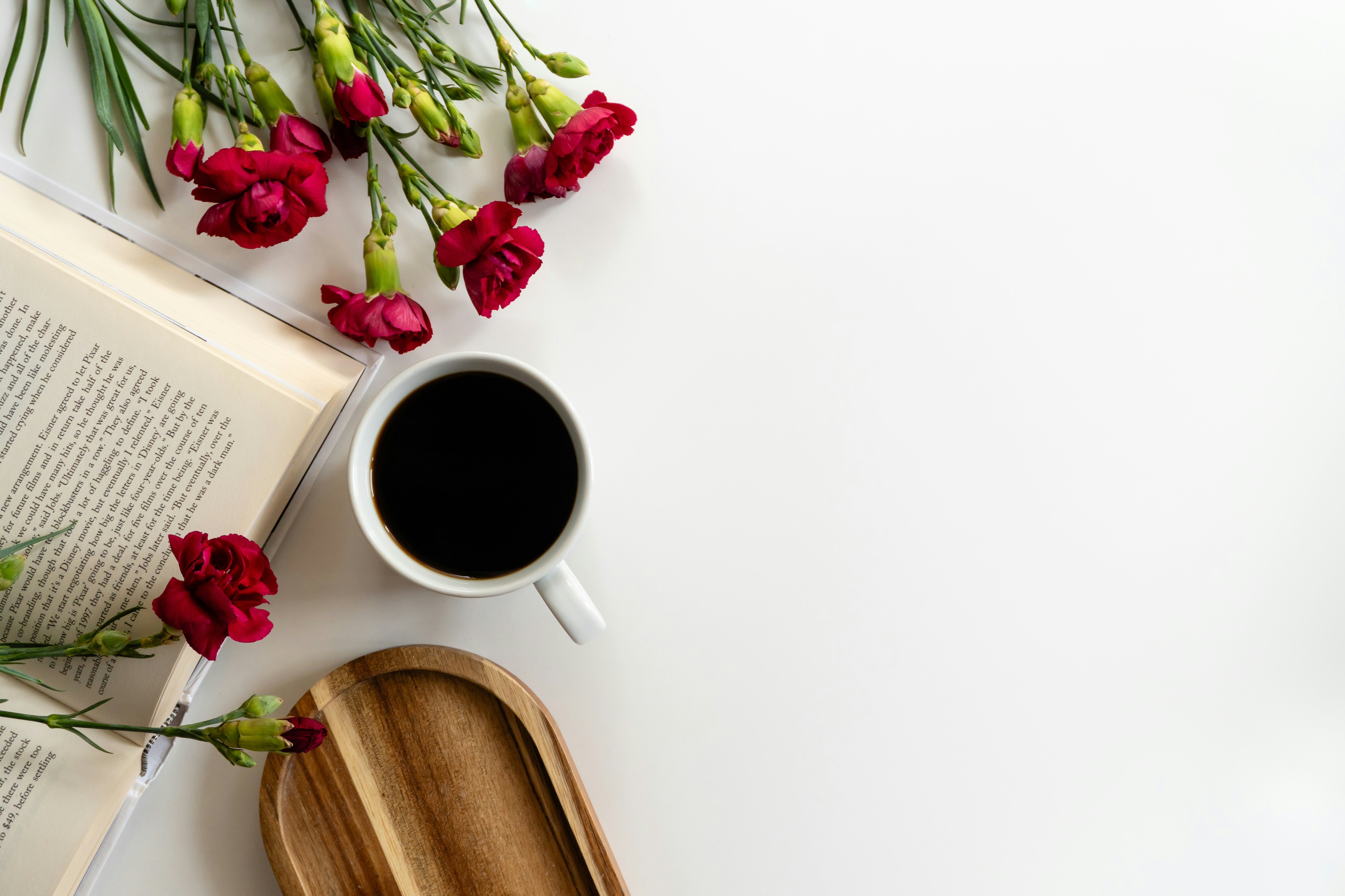 Quiet Morning Ritual: Coffee, Flowers, and a Page Turn