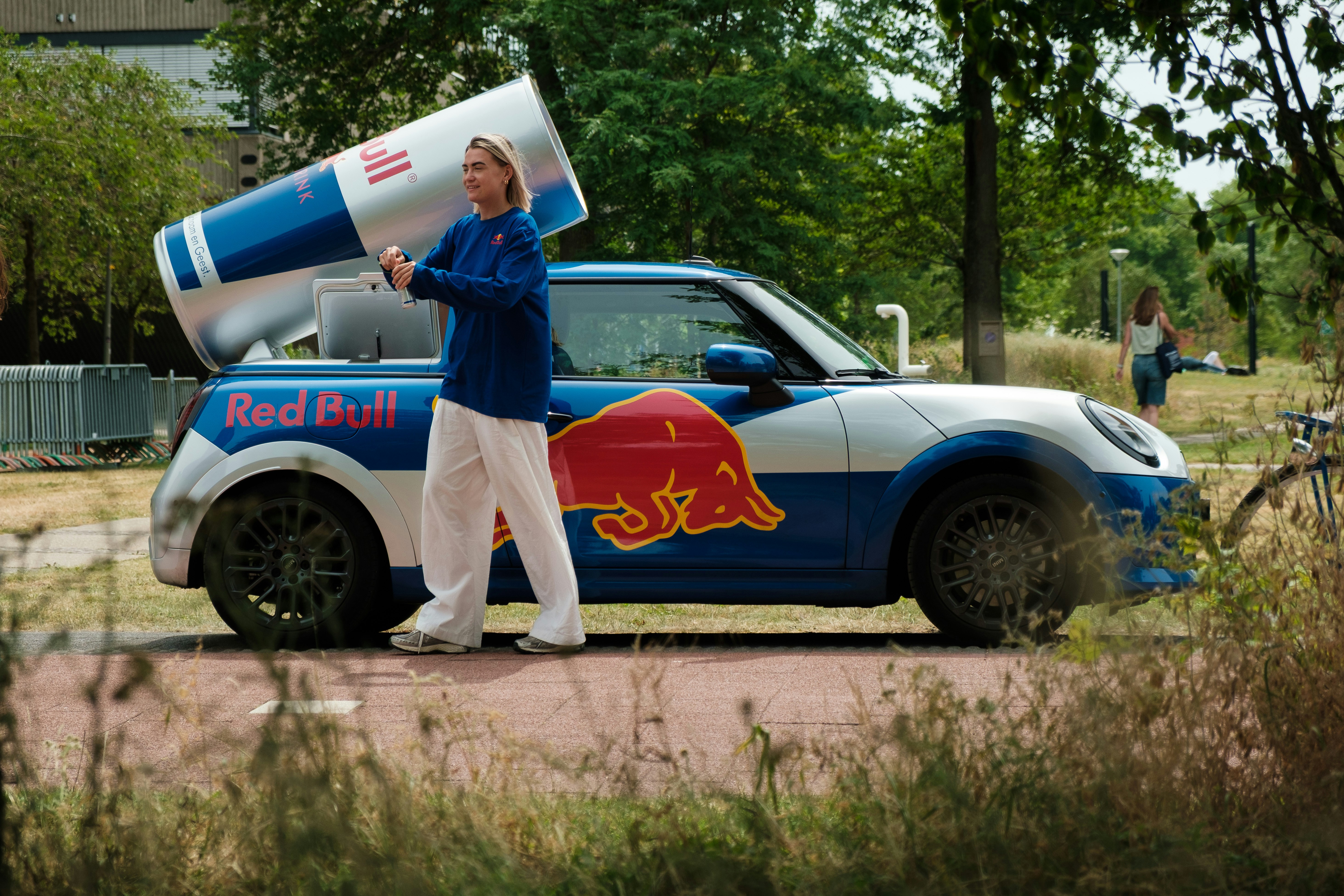 Red Bull Mobile: A Blue Mini Cooper Streaks by with a Giant Can
