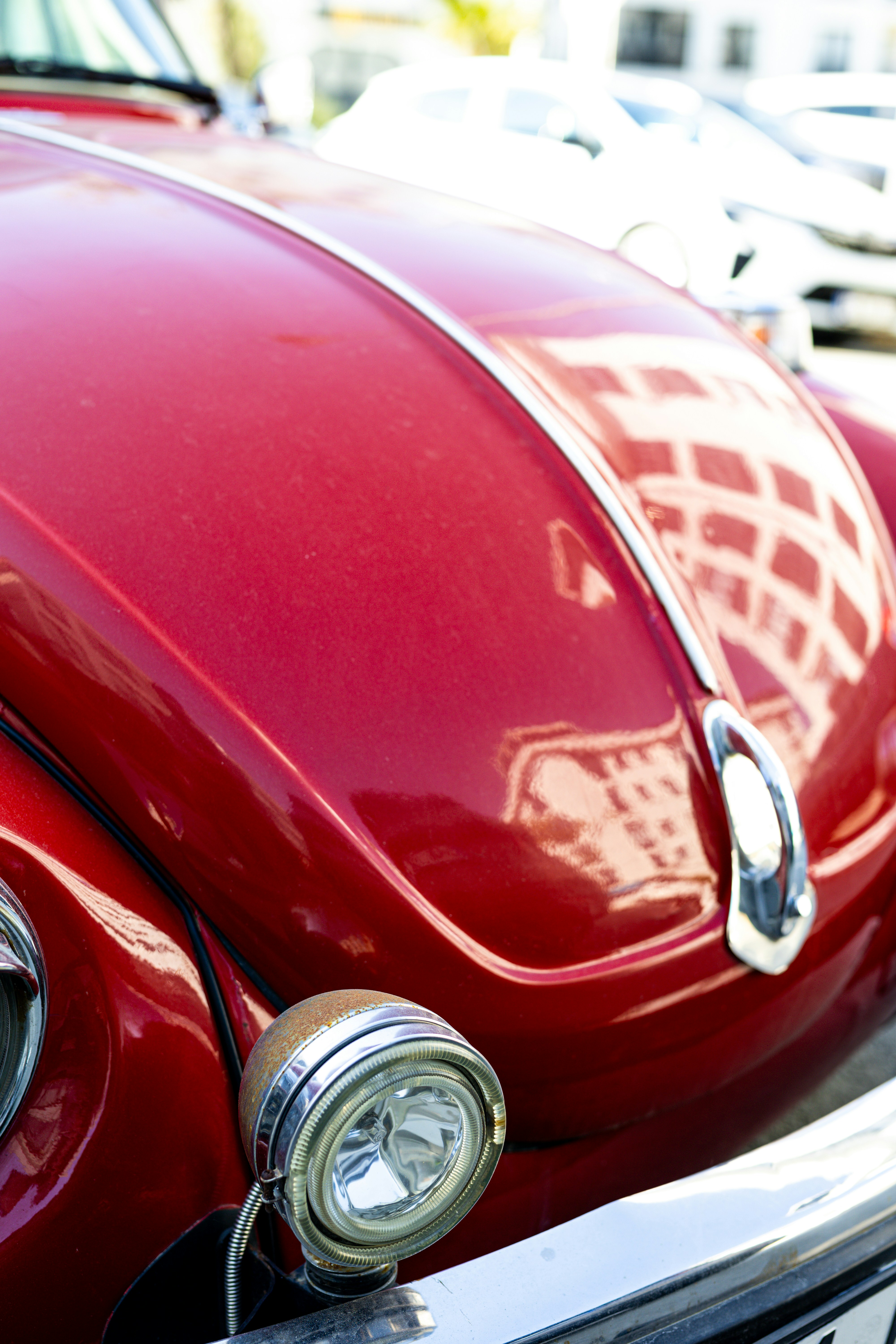 Curved Red Chrome: A Classic Car Frontier