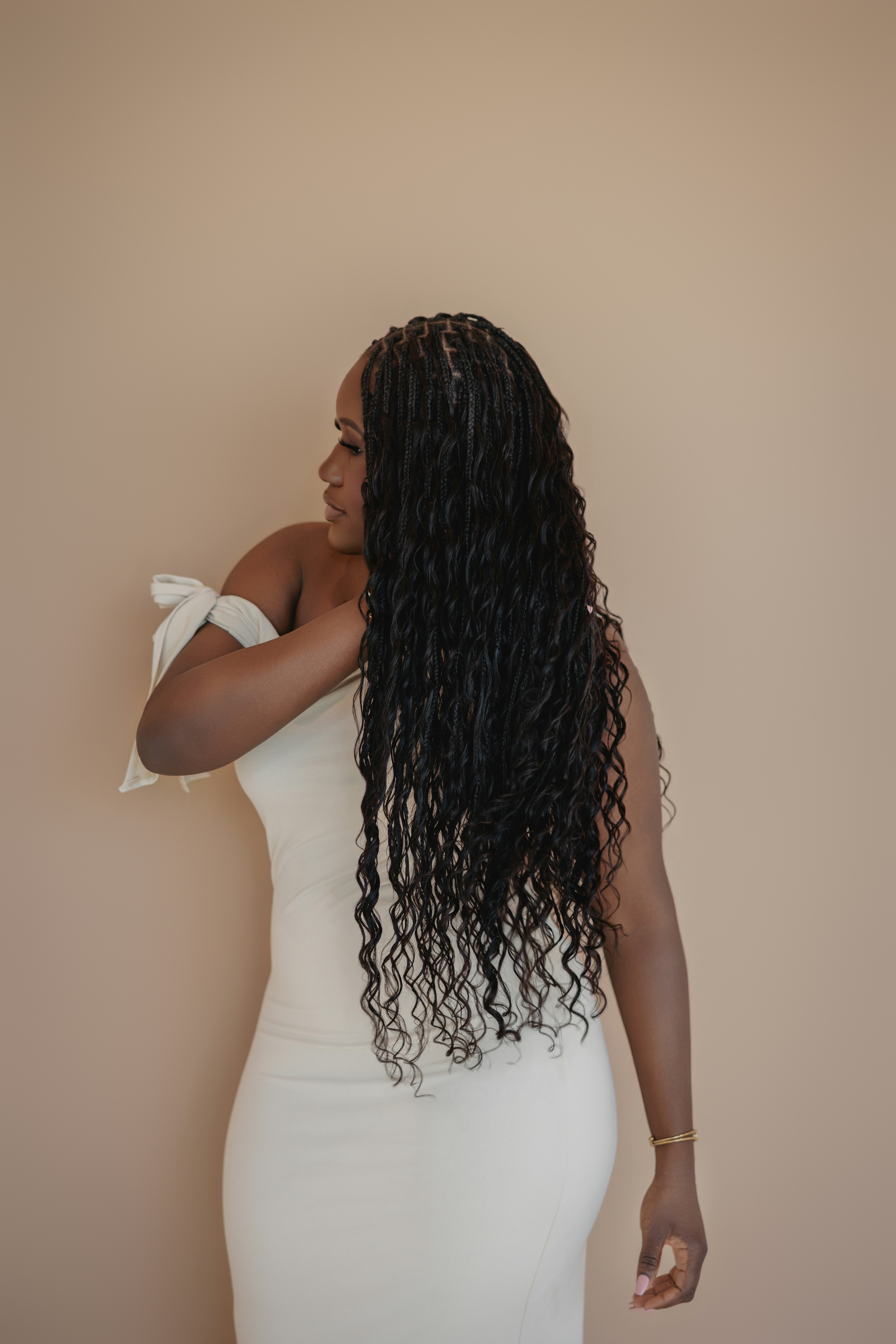 Silhouette in White: A Portrait with Draped Grace