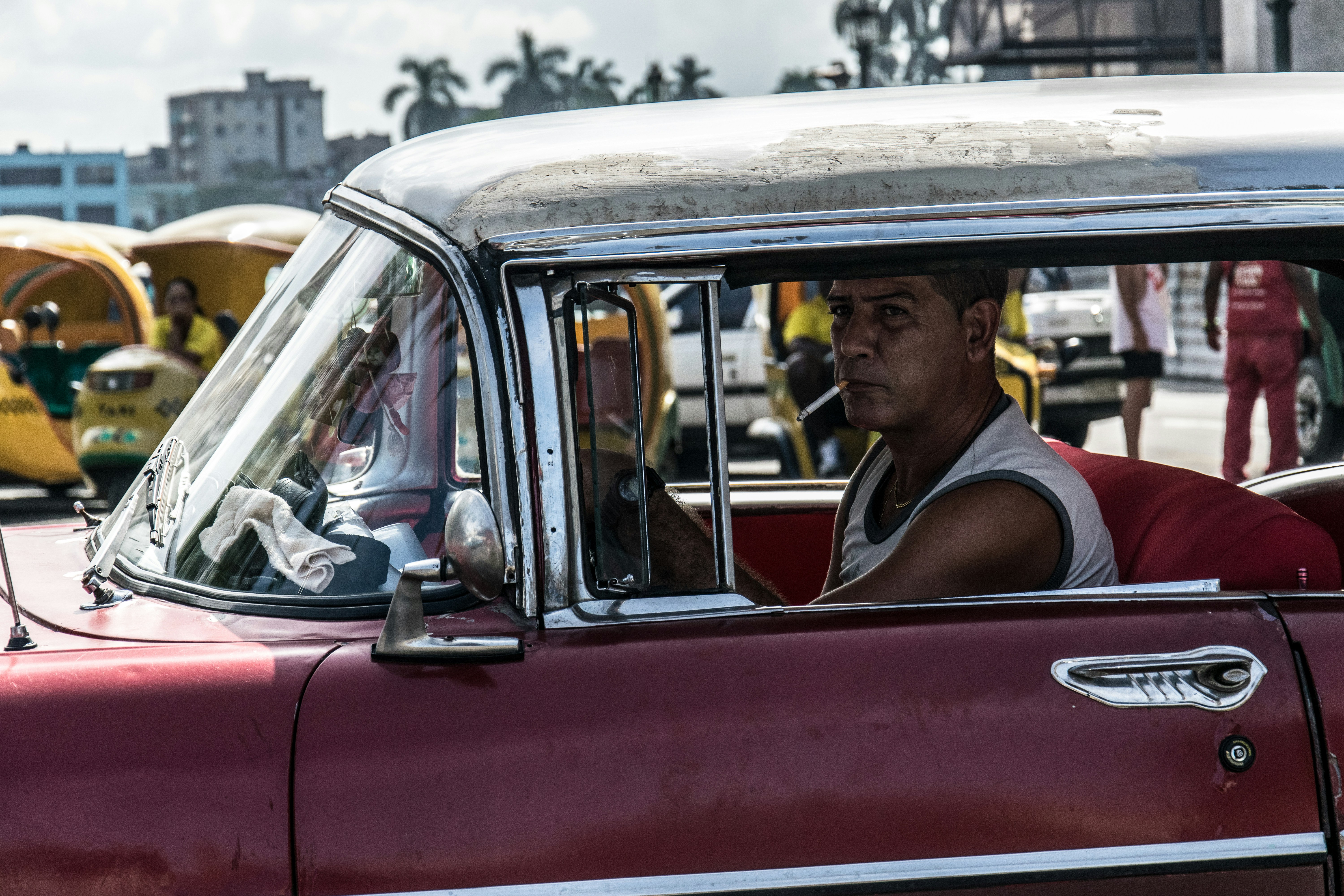 Chrome and Contemplation: A Driver Stares into the Side-window Moment