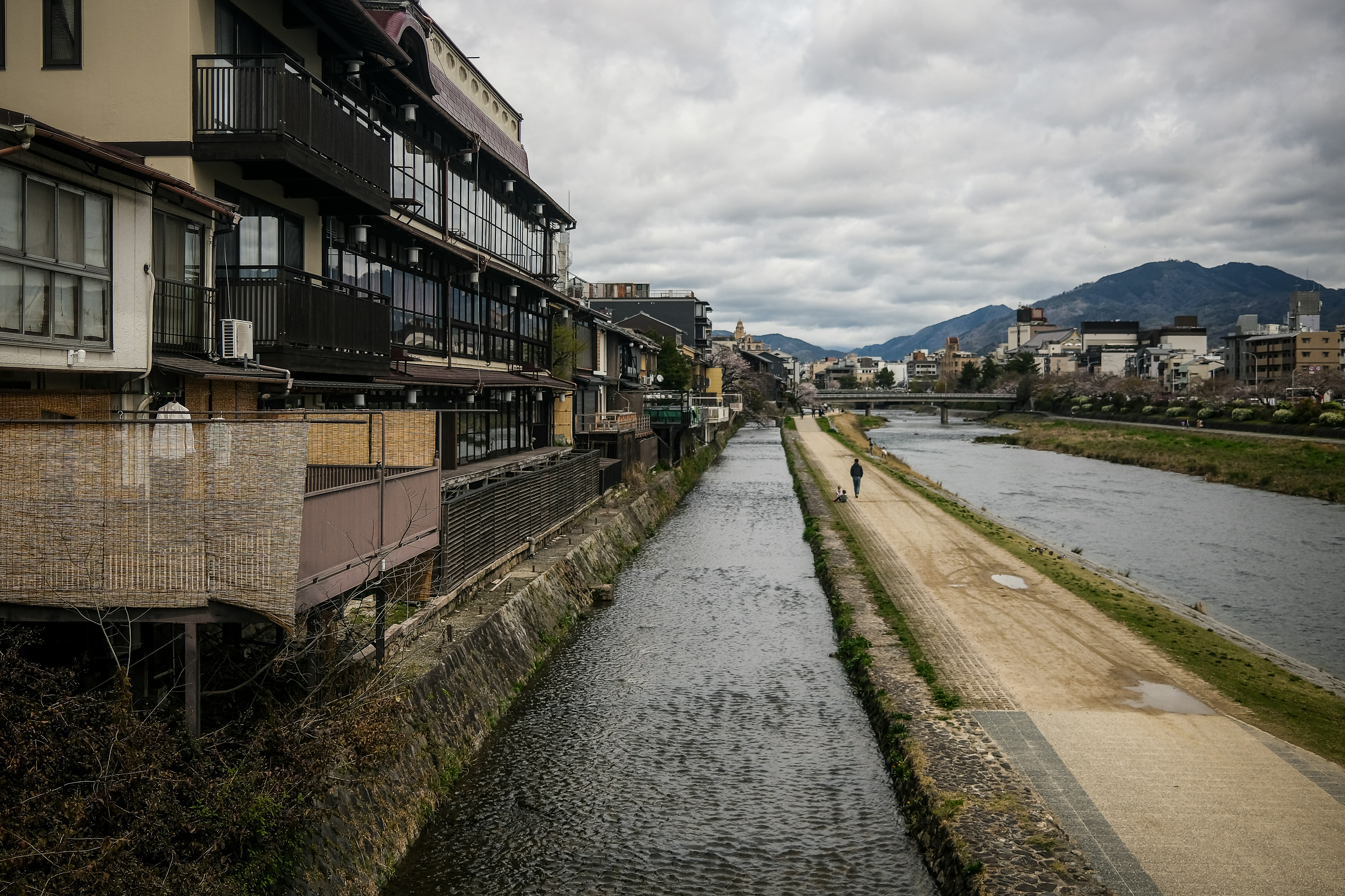 Riverside Walk: a Quiet Channel between Town and Distant Hills