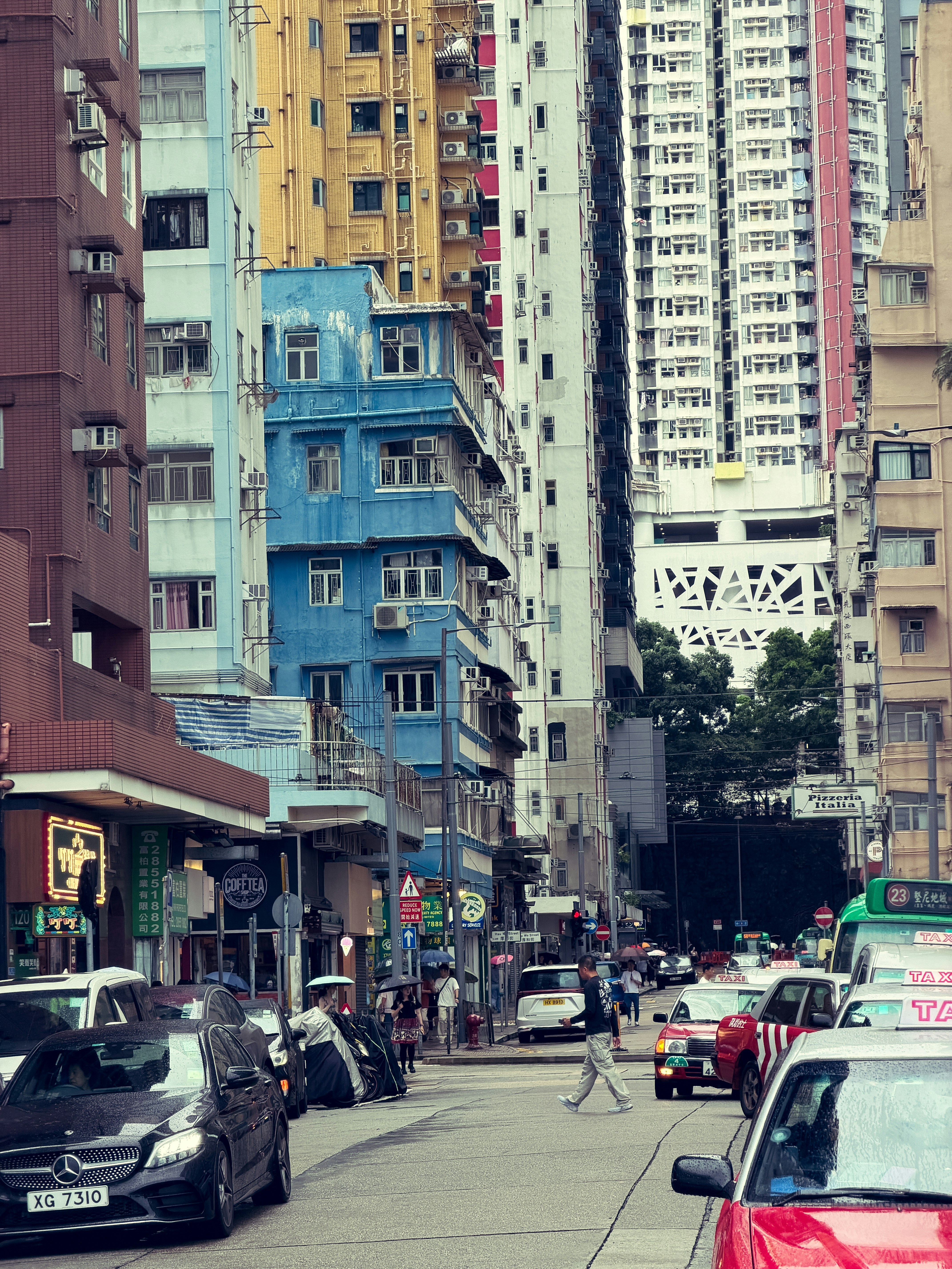 Colorful High-Rane Corridor: A Street Amid Tall Residential Blocks