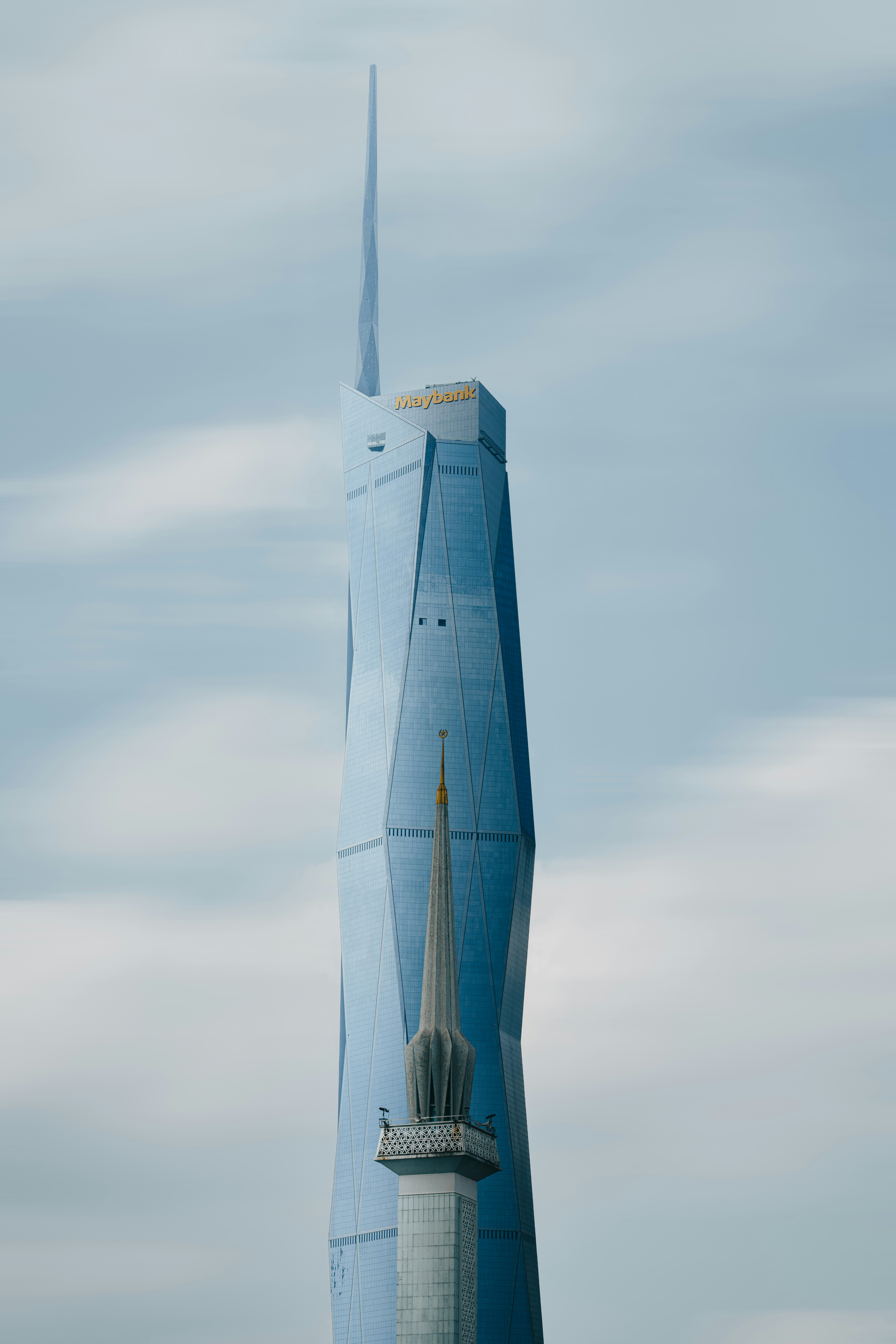 Shifting Skyward: The Blue Spire Reaches Toward a Dreamy Skyline