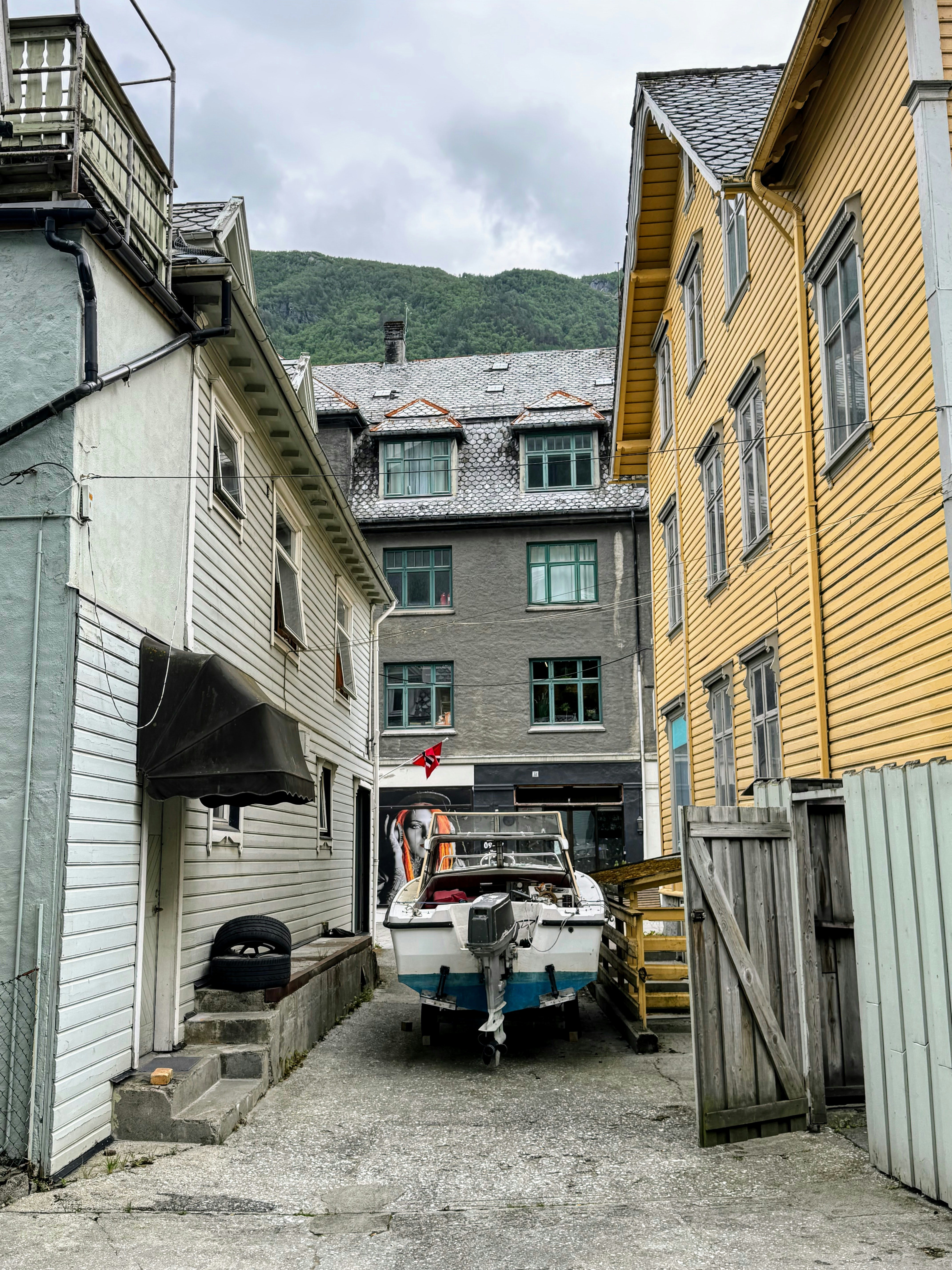 Boat Between Narrow Nordic Alleys