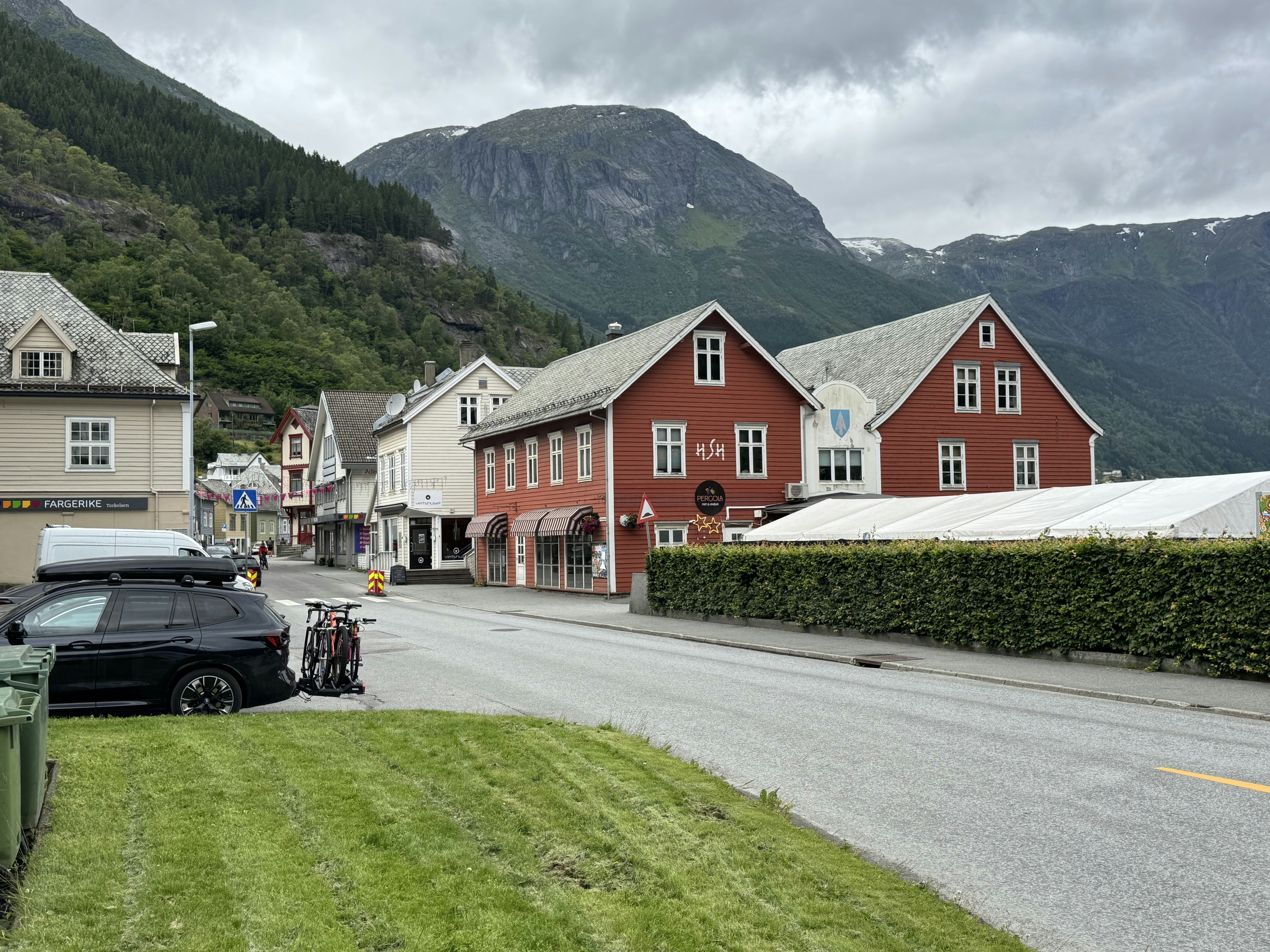 Colorful Nordic Street Meets Alpine Backdrop