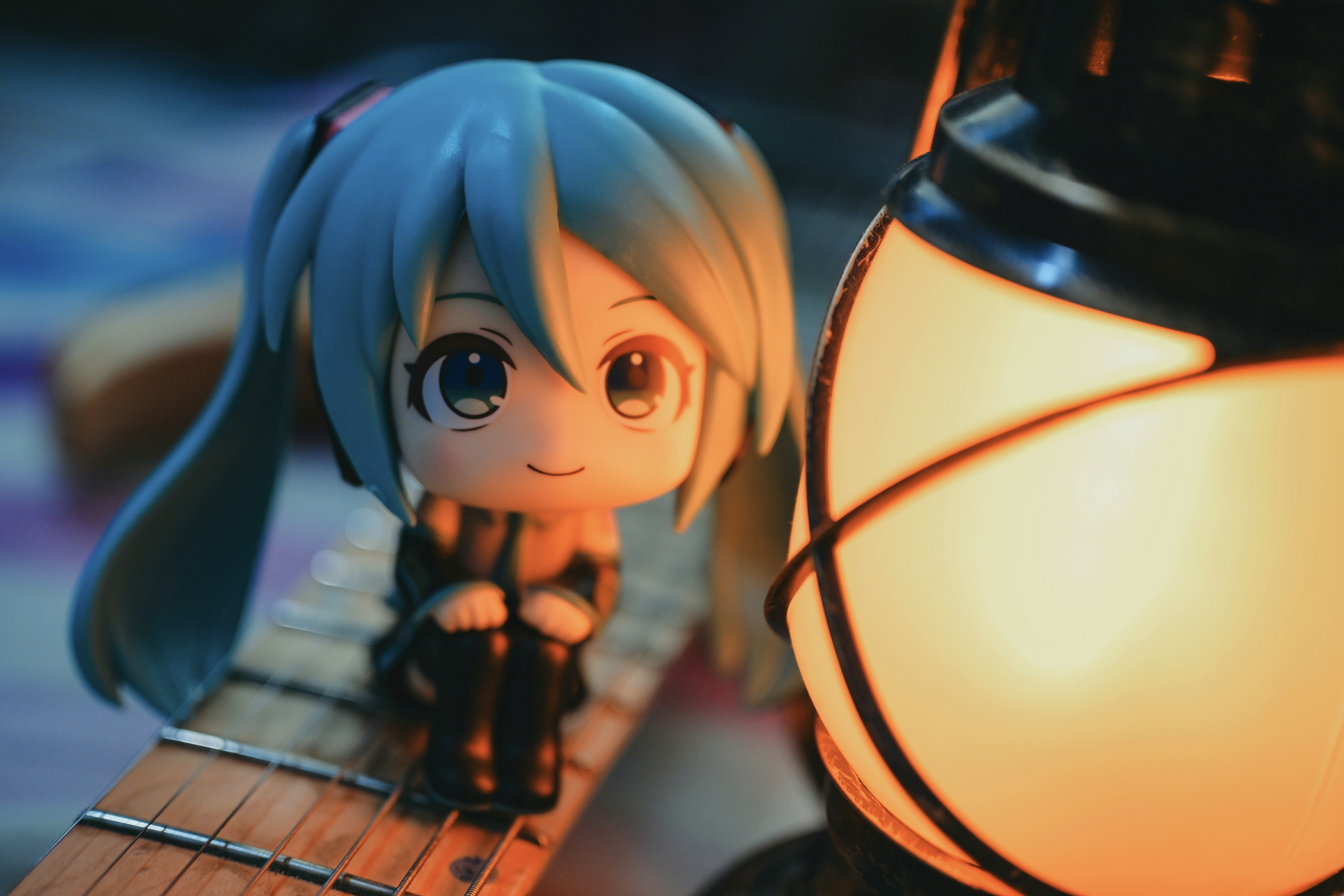 A Tiny Idol Reaches for Warm Light