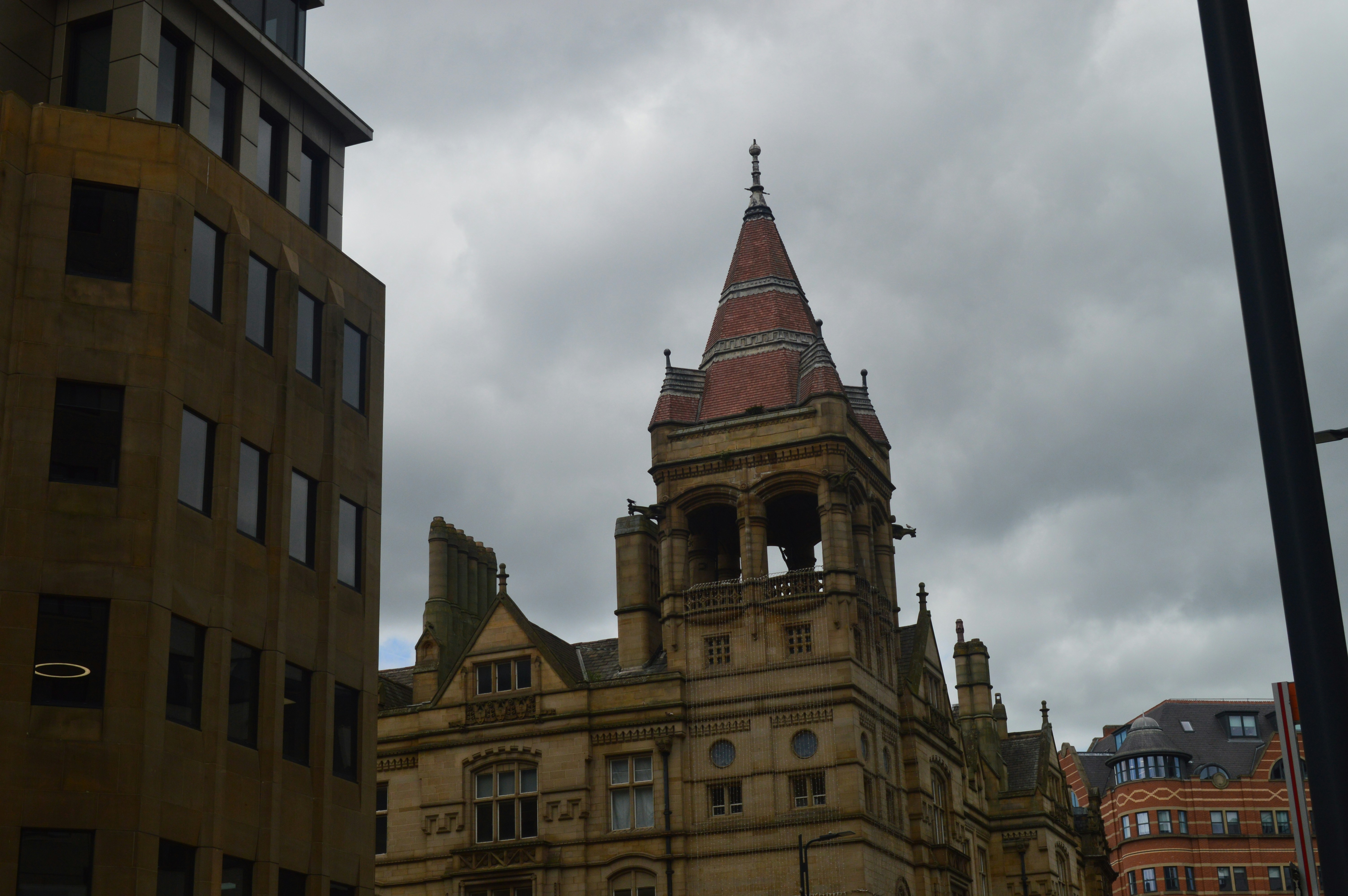 Towered Cityscape Under overcast Skies
