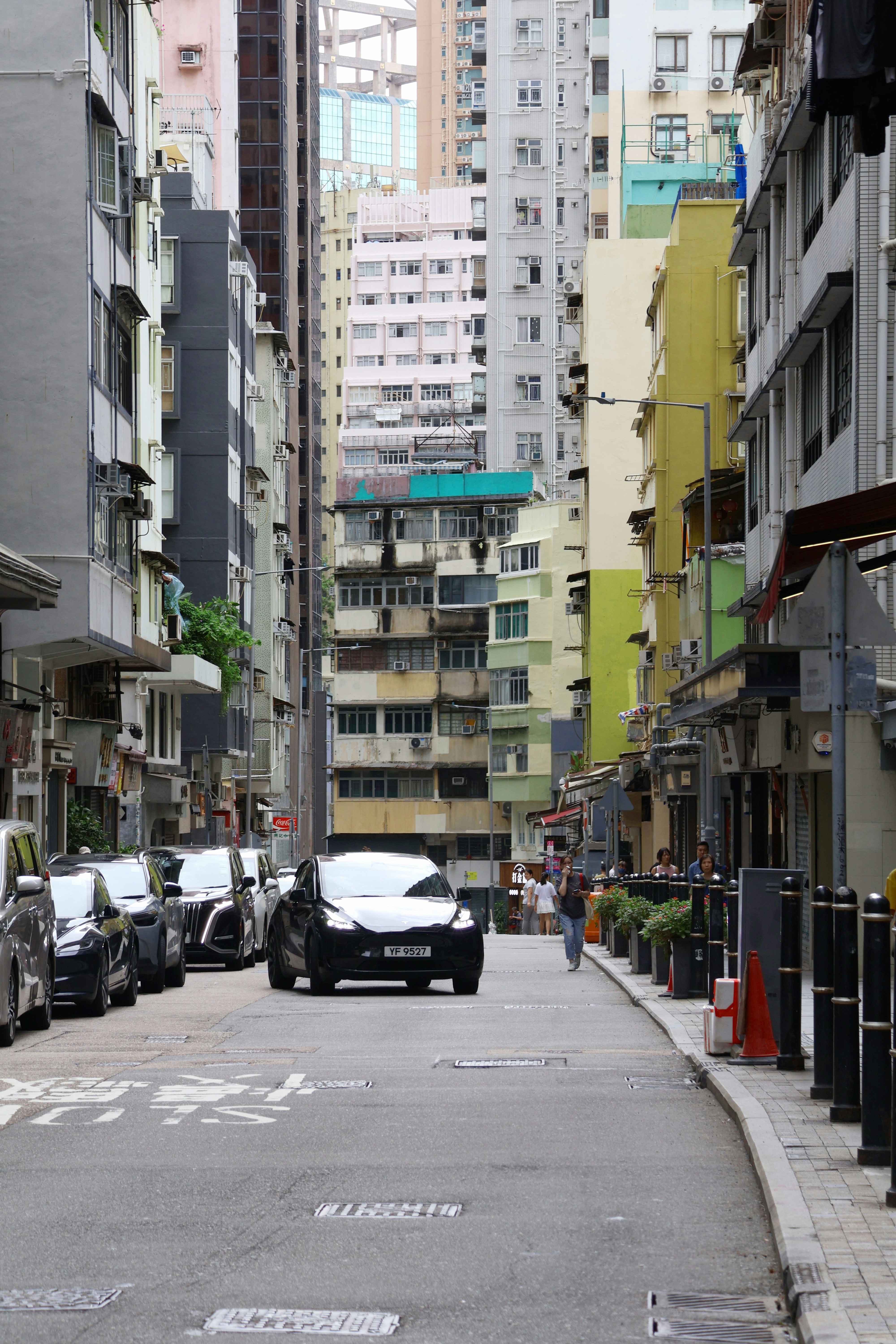 Urban Corridor: Colorful Facades Rise Above a Quiet Street