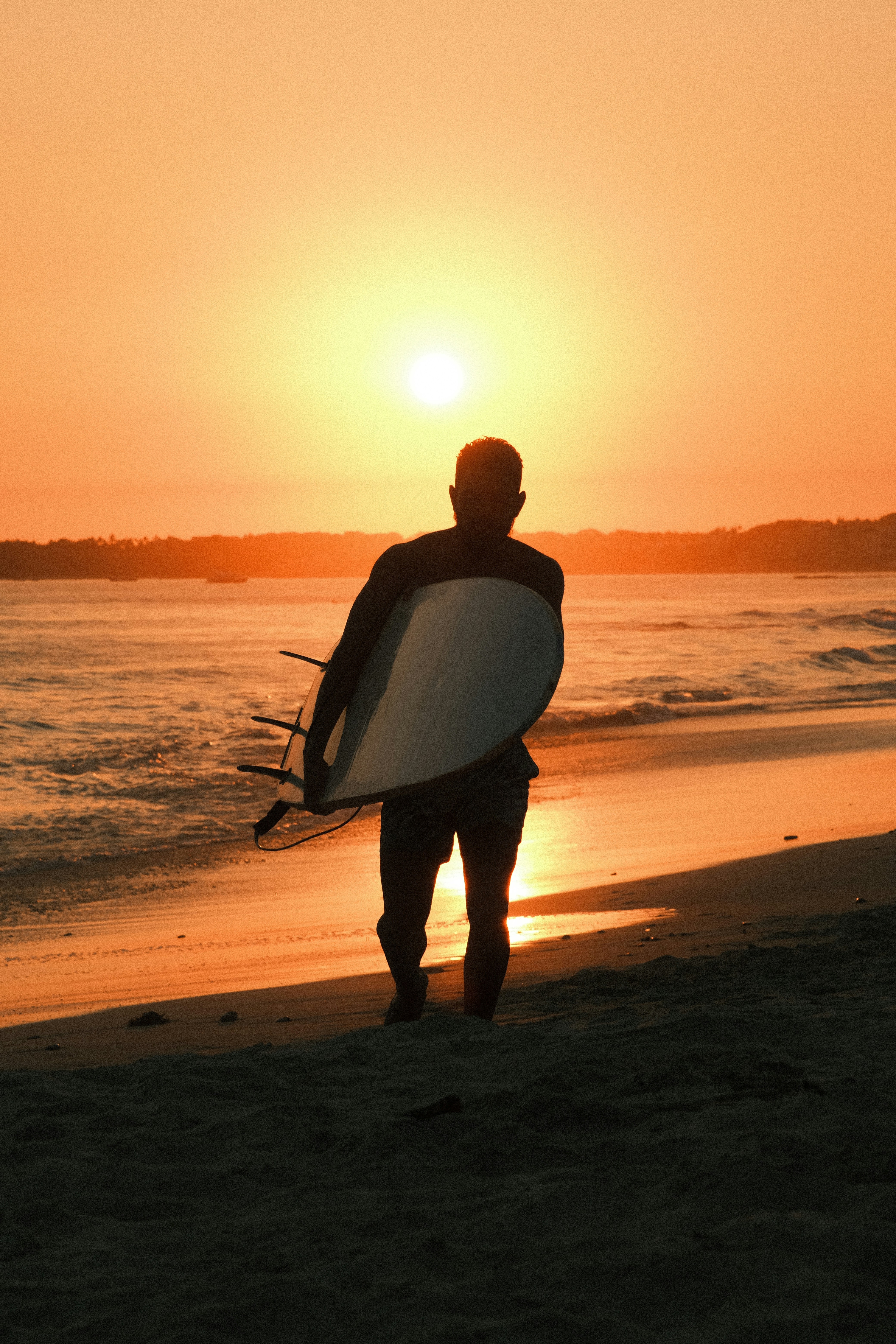 Sunset Silhouette: Surfer with the Last Light