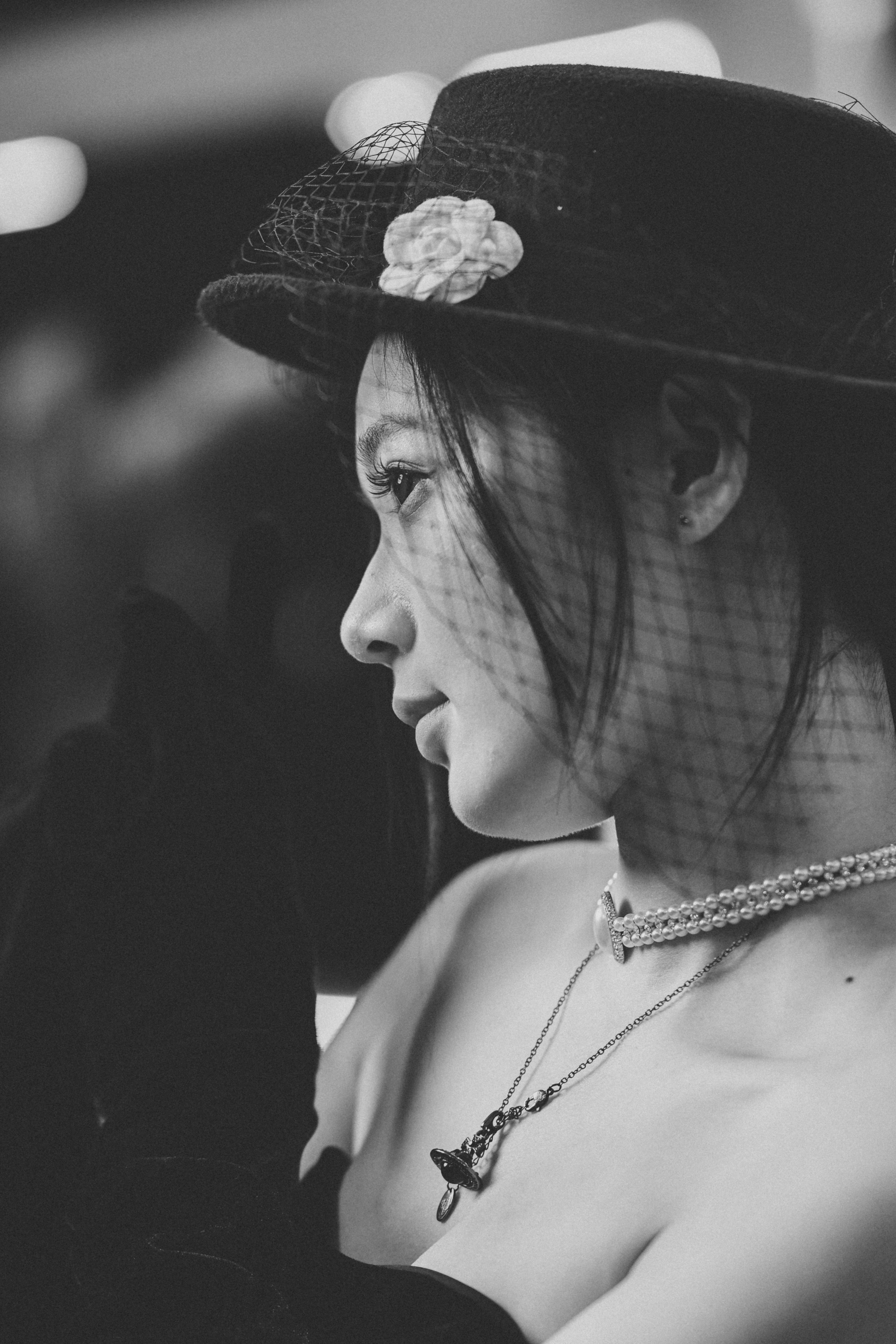 Elegance in Shadow: A Side Portrait with Veiled Light