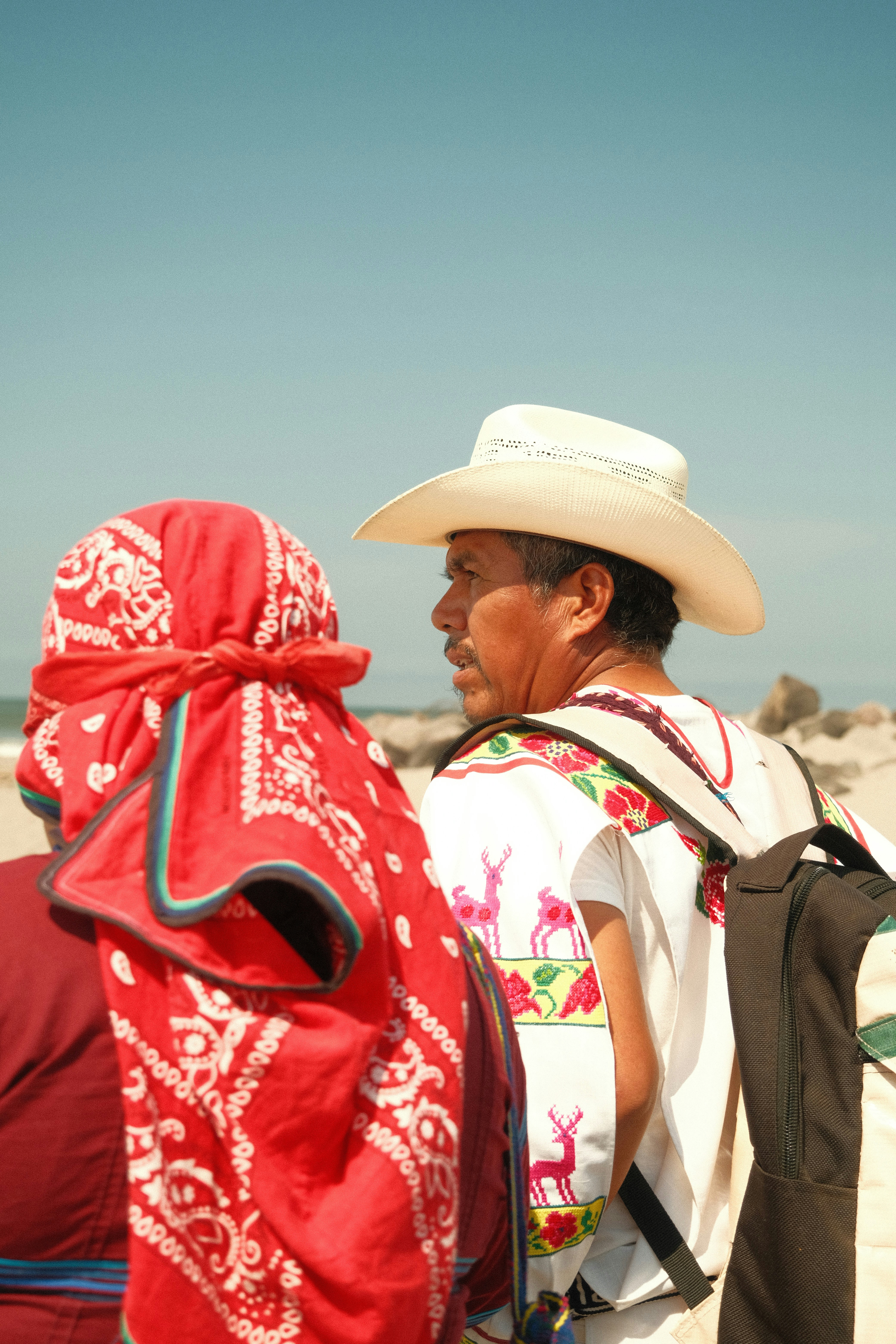 Silhouette of the Stranger and the Rancher: A Quiet Exchange Under Open Skies