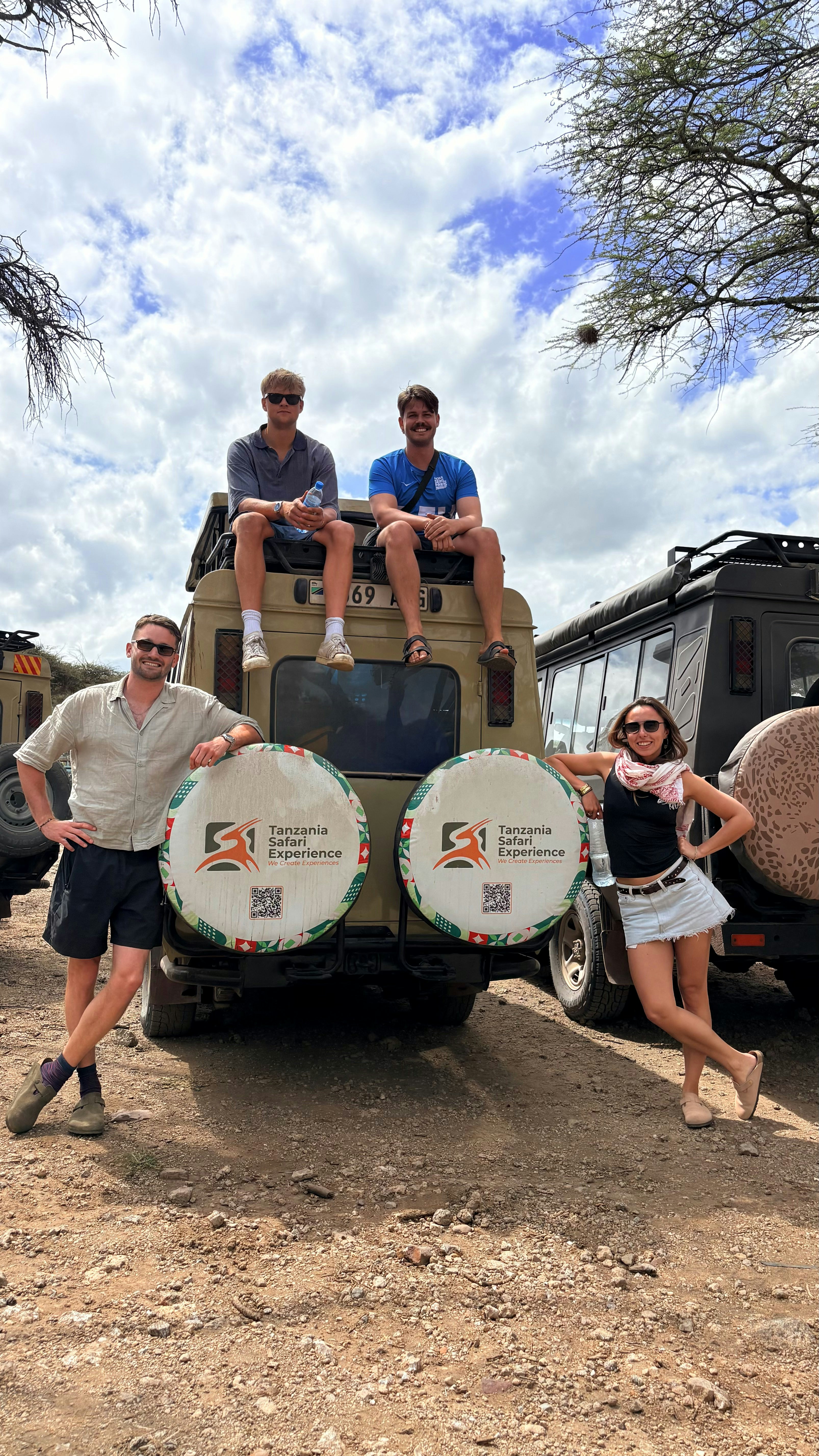 Safari Squad on a Rugged Vehicle Backdrop