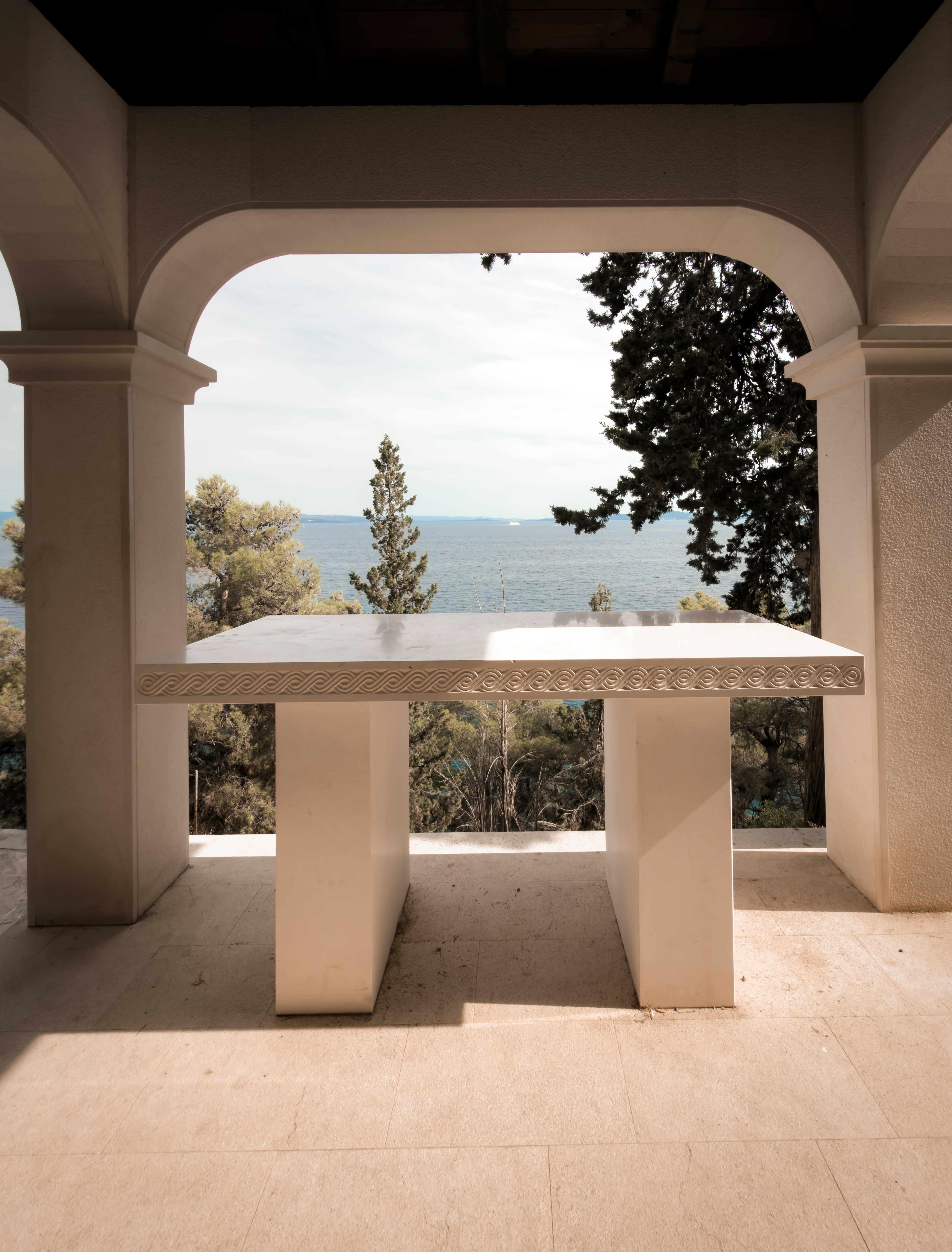 Ocean-view Terrace Framed by Archways
