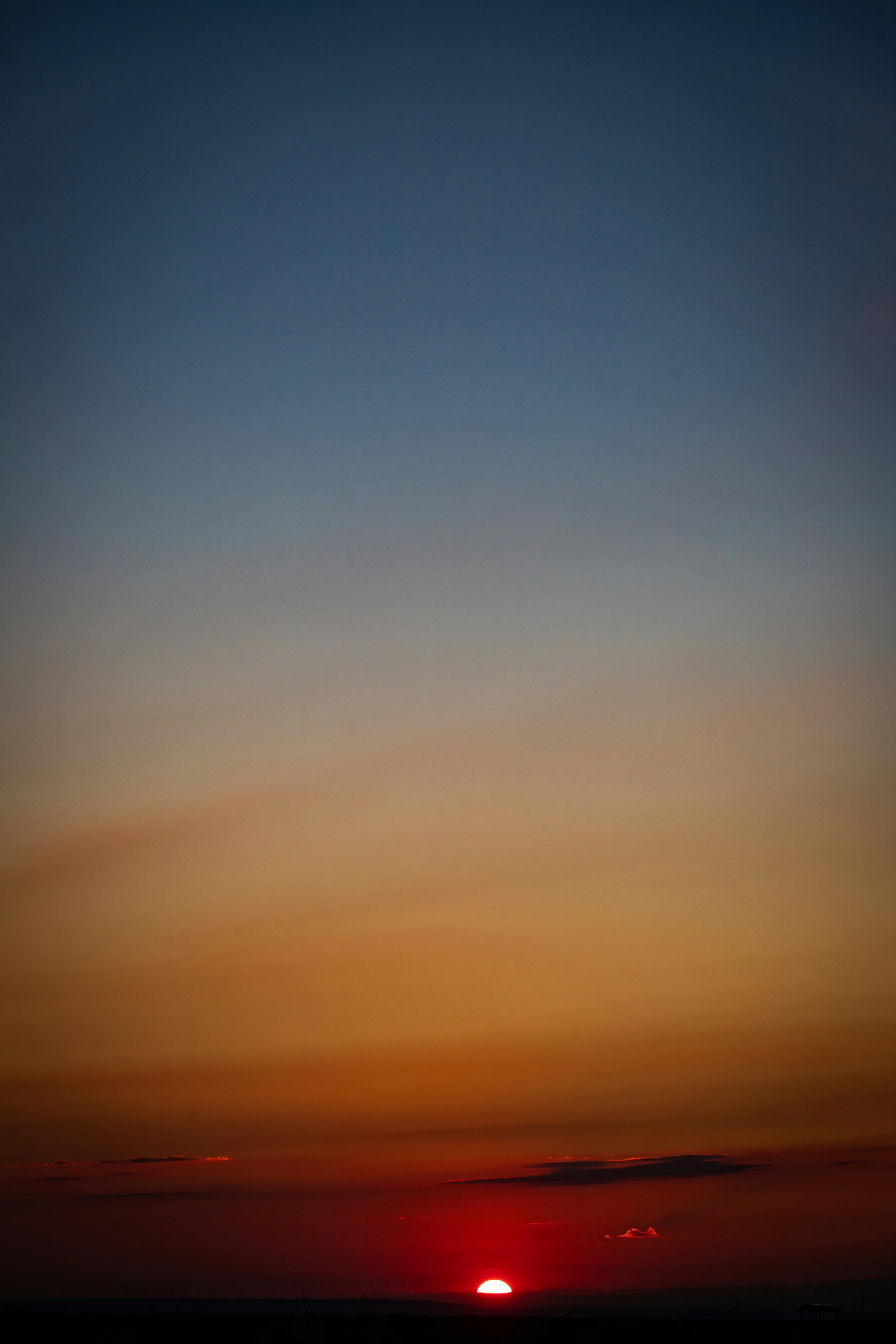 Low Sun, High Horizon: A Soft, Contemplative Sunset Fade