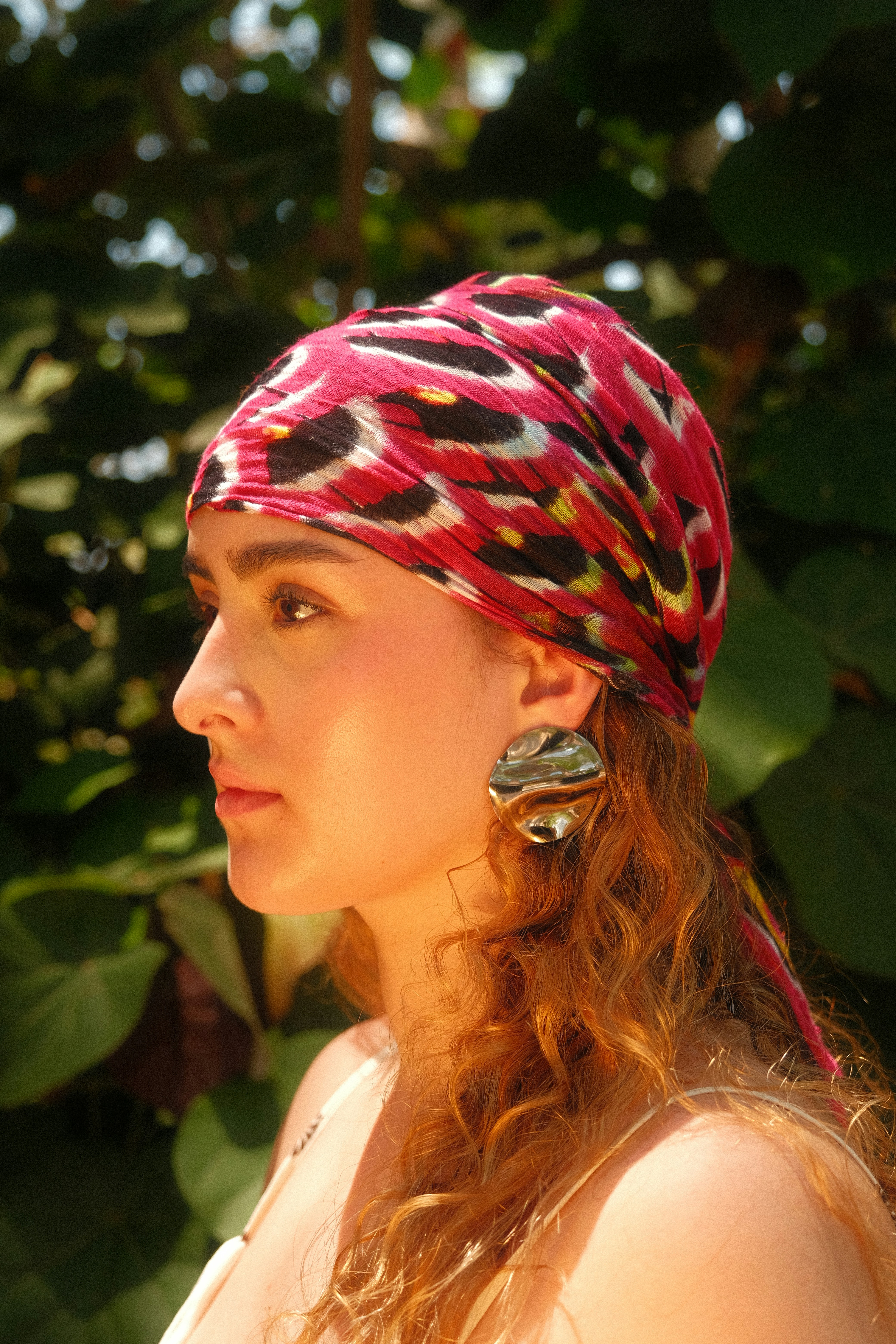Vivid Turban and Quiet Gaze in Dappled Sunlight