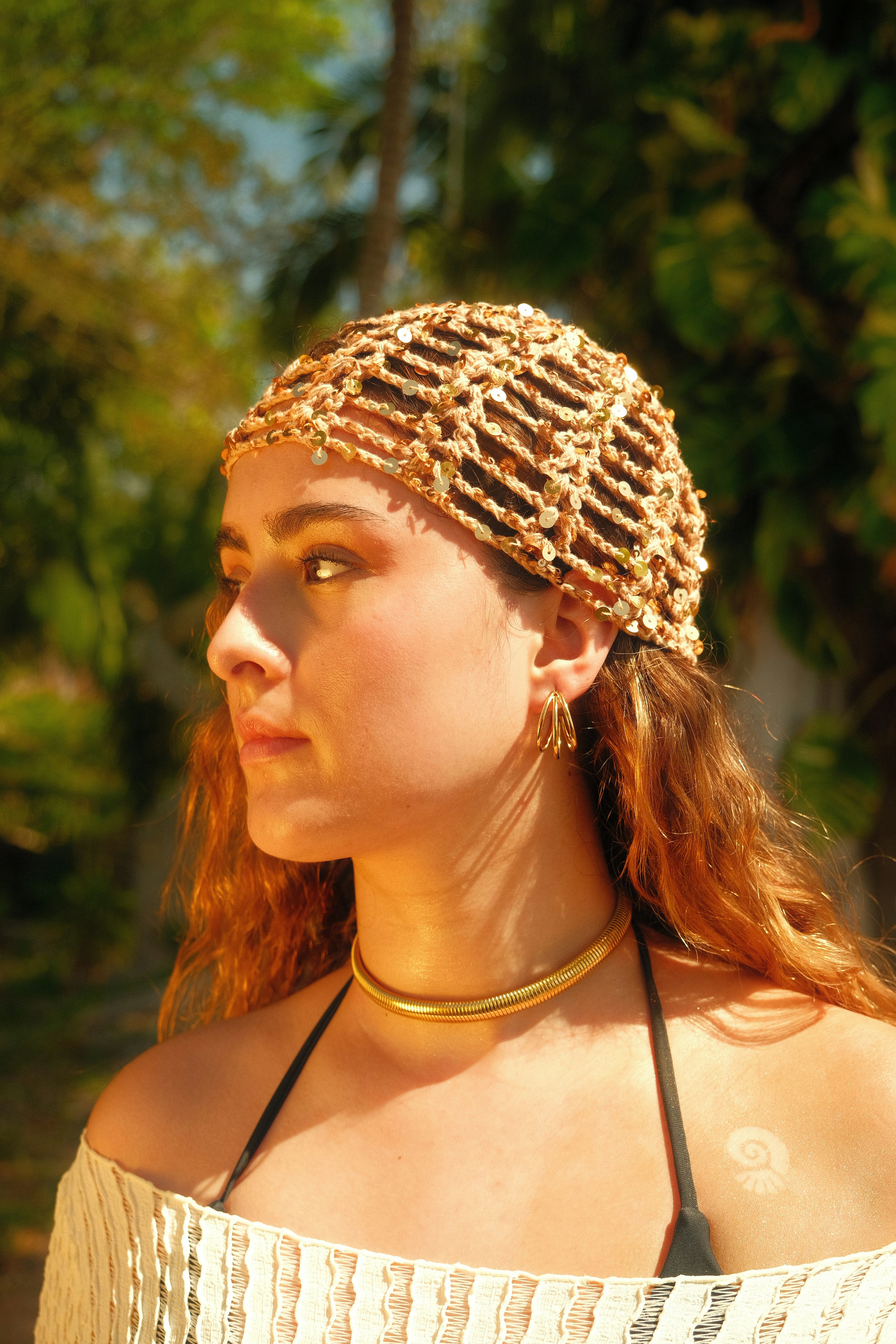 Golden Threads: Portrait in Sunlit Adornments