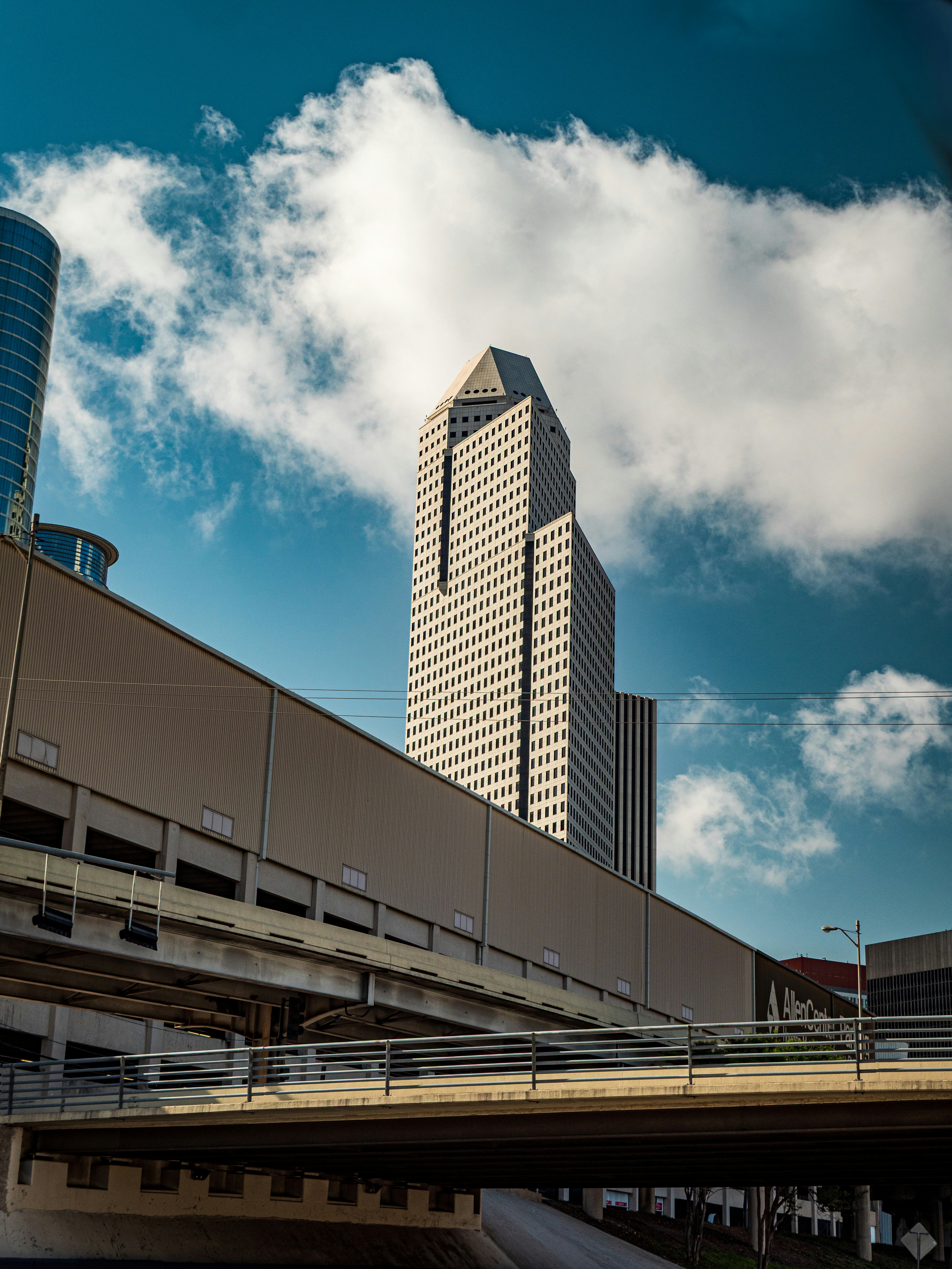 Skyscraper Poised Above the Overpass