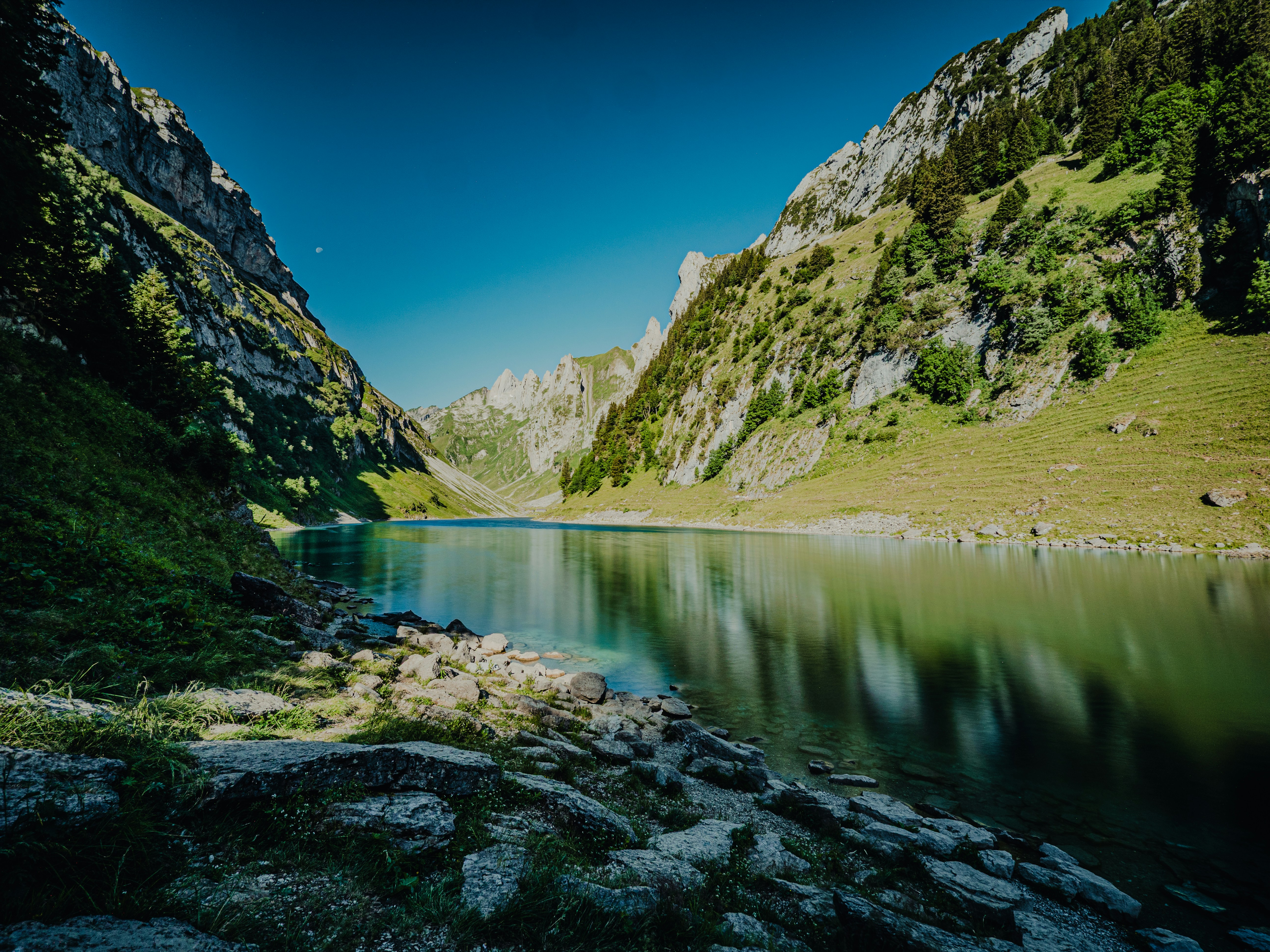Azure Gorge Mirror: Mountain Lake Under a Clear Sky