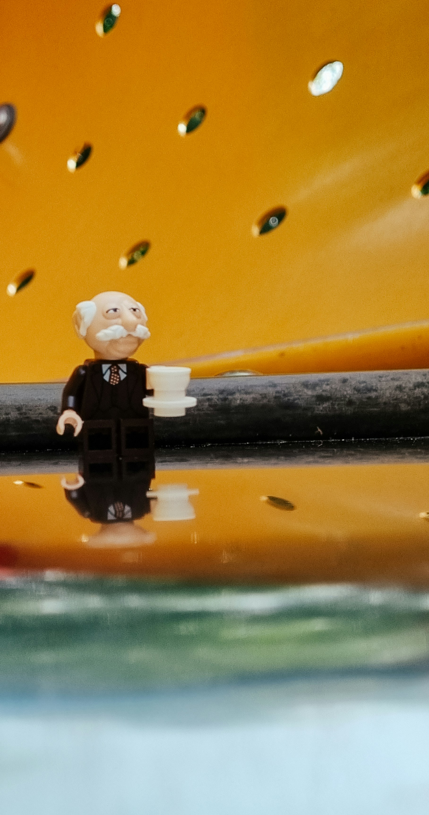 Lego Statesman at the Edge of a Shimmering Teal Horizon