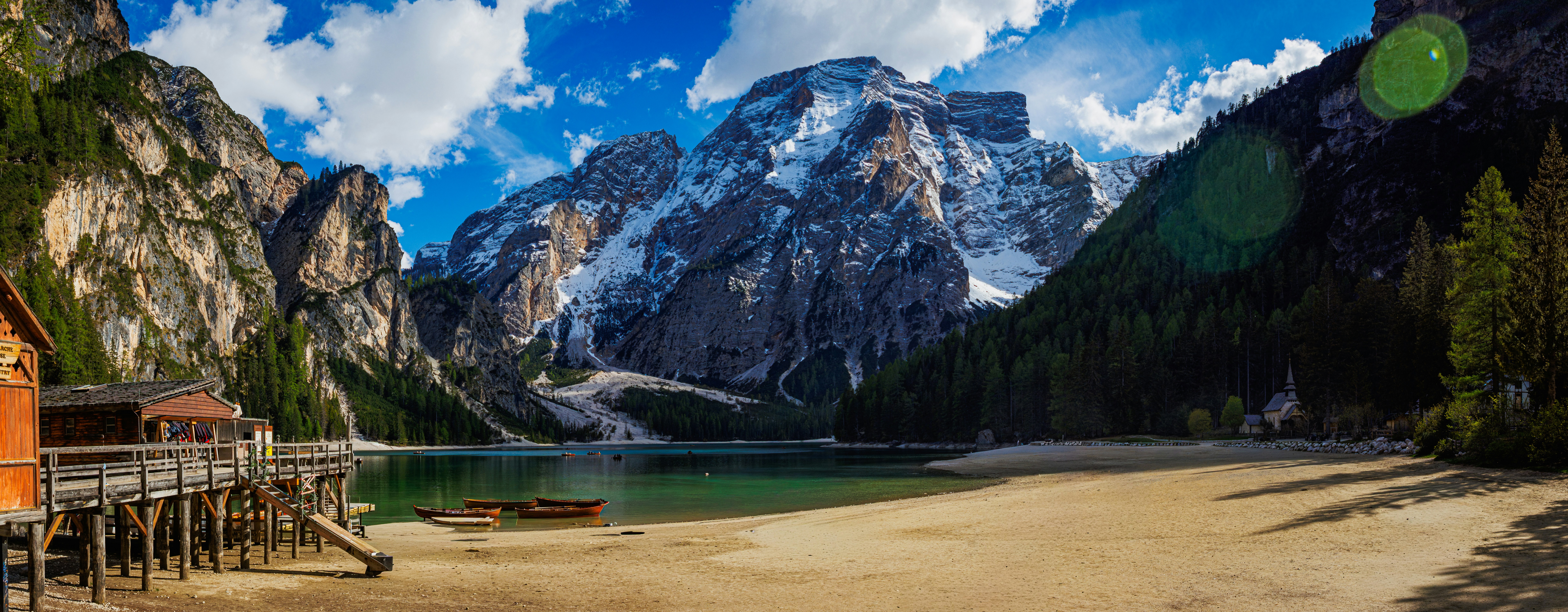 Glacial Mirror: Mountain Lake Beneath a Cerulean Sky