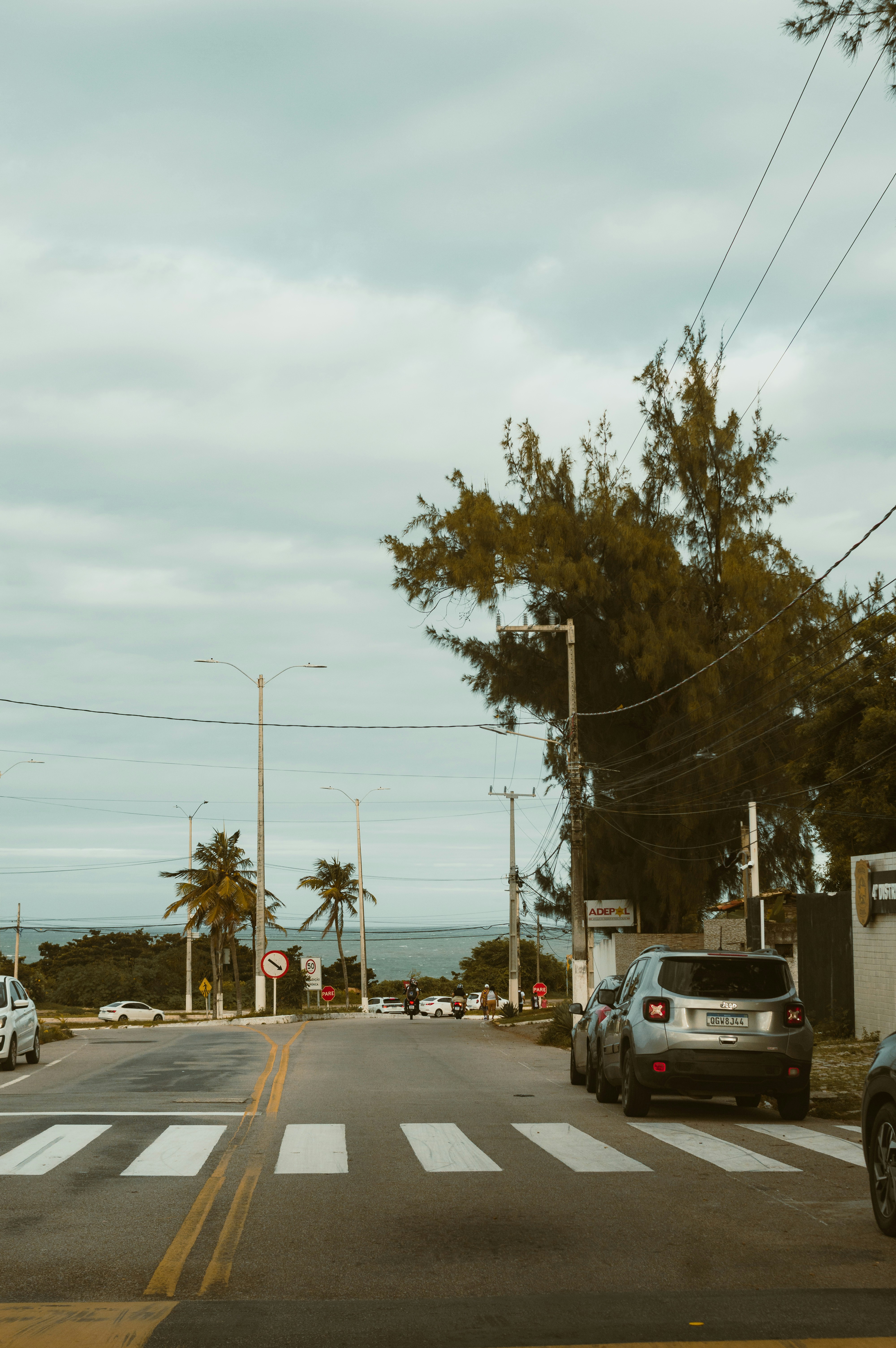Coastal Boulevard Crossing: A Quiet Street Toward the Sea