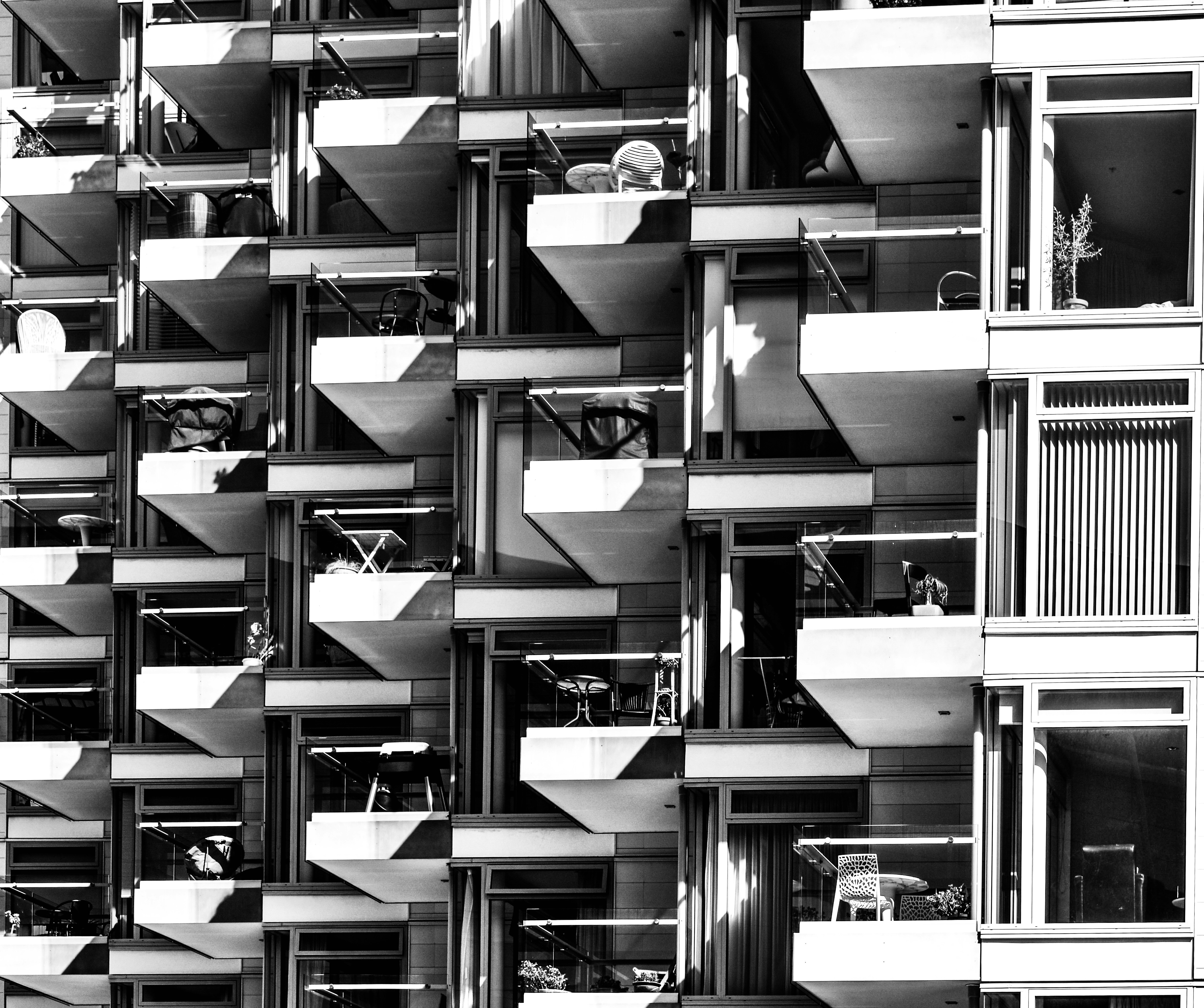 Urban Echoes: Repeating Balconies in Monochrome Grid