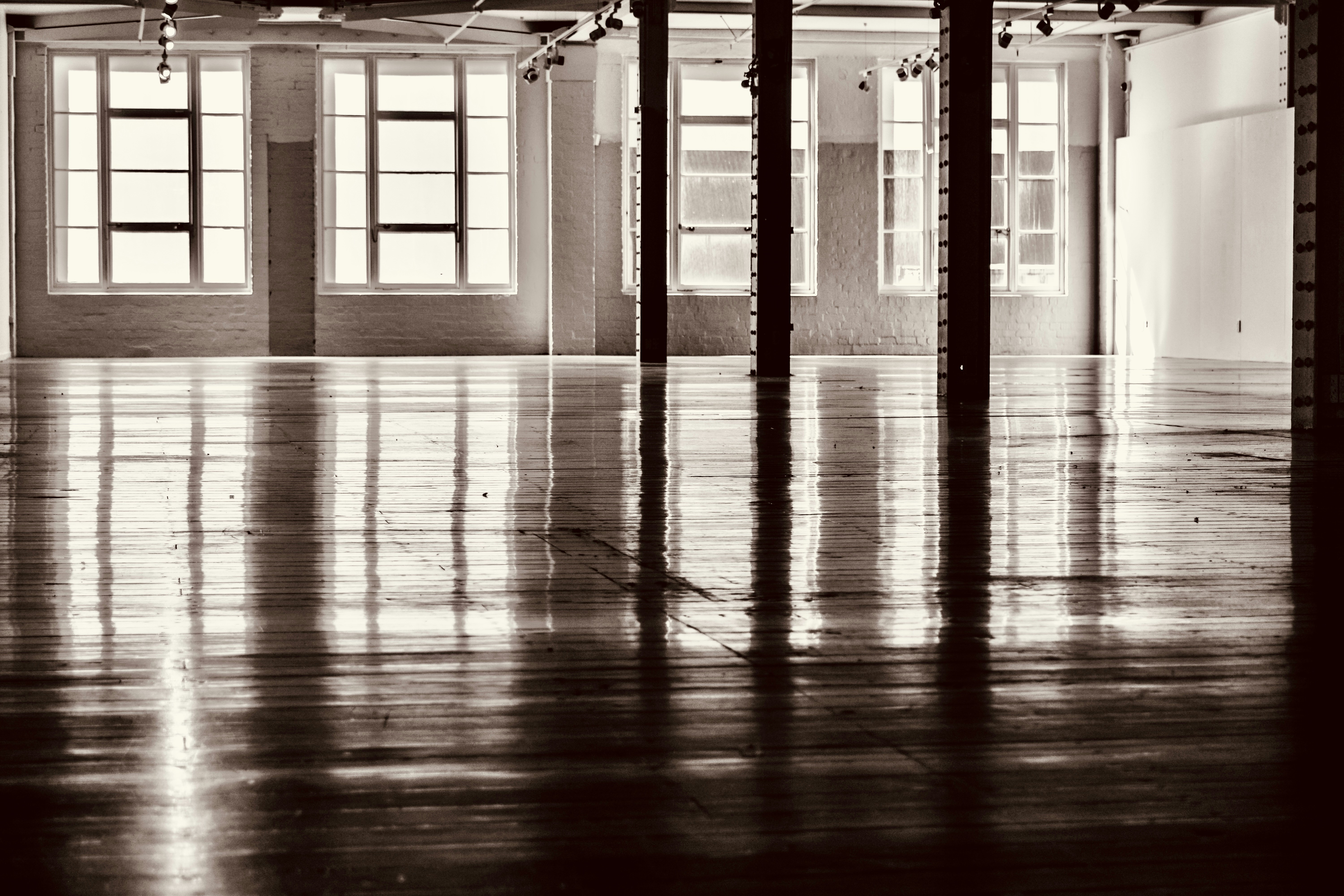Echoes of an Empty Hall: Glimmering Floors and Silent Columns