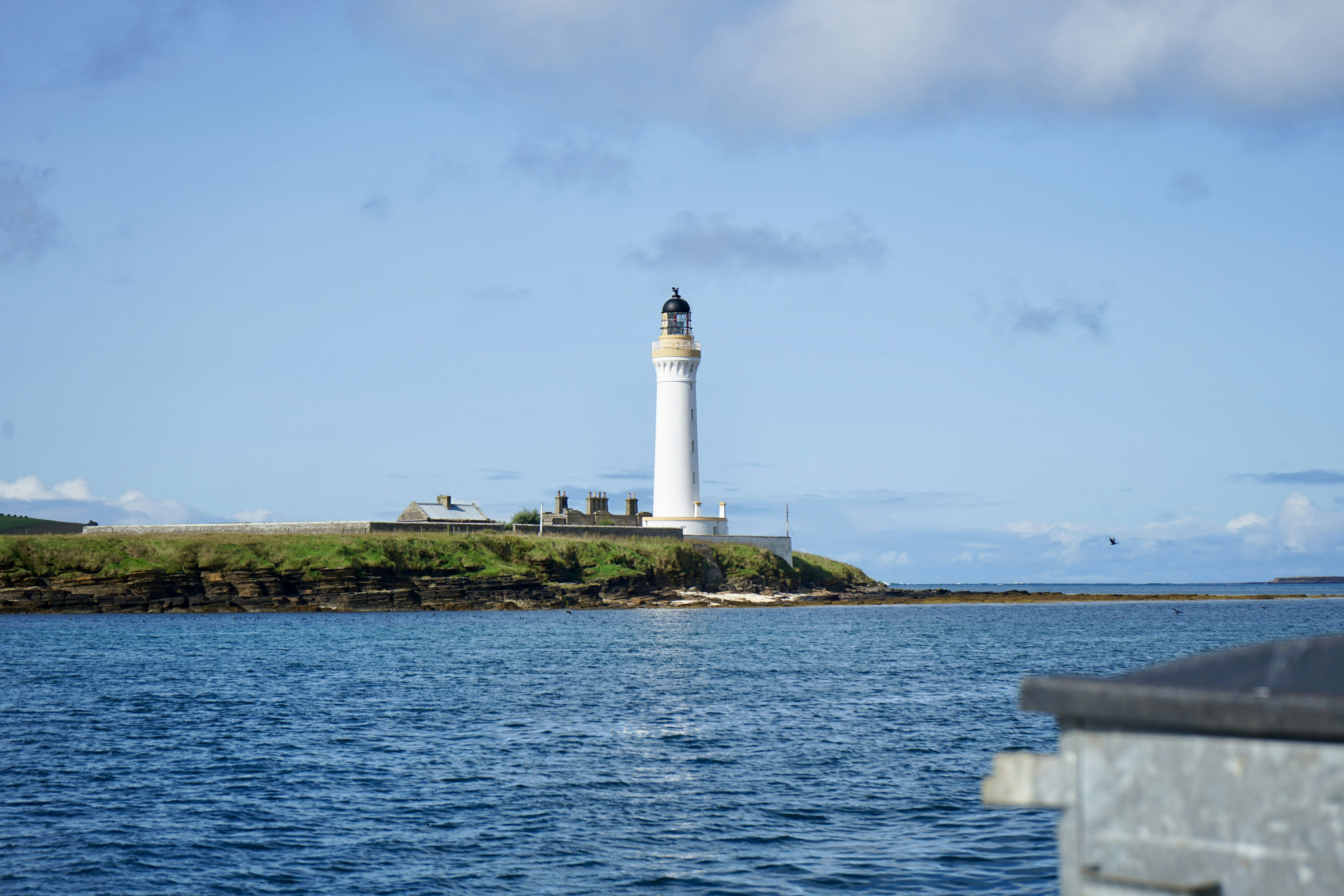 Beacon on the Horizon: A Quiet Coastal Lighthouse)