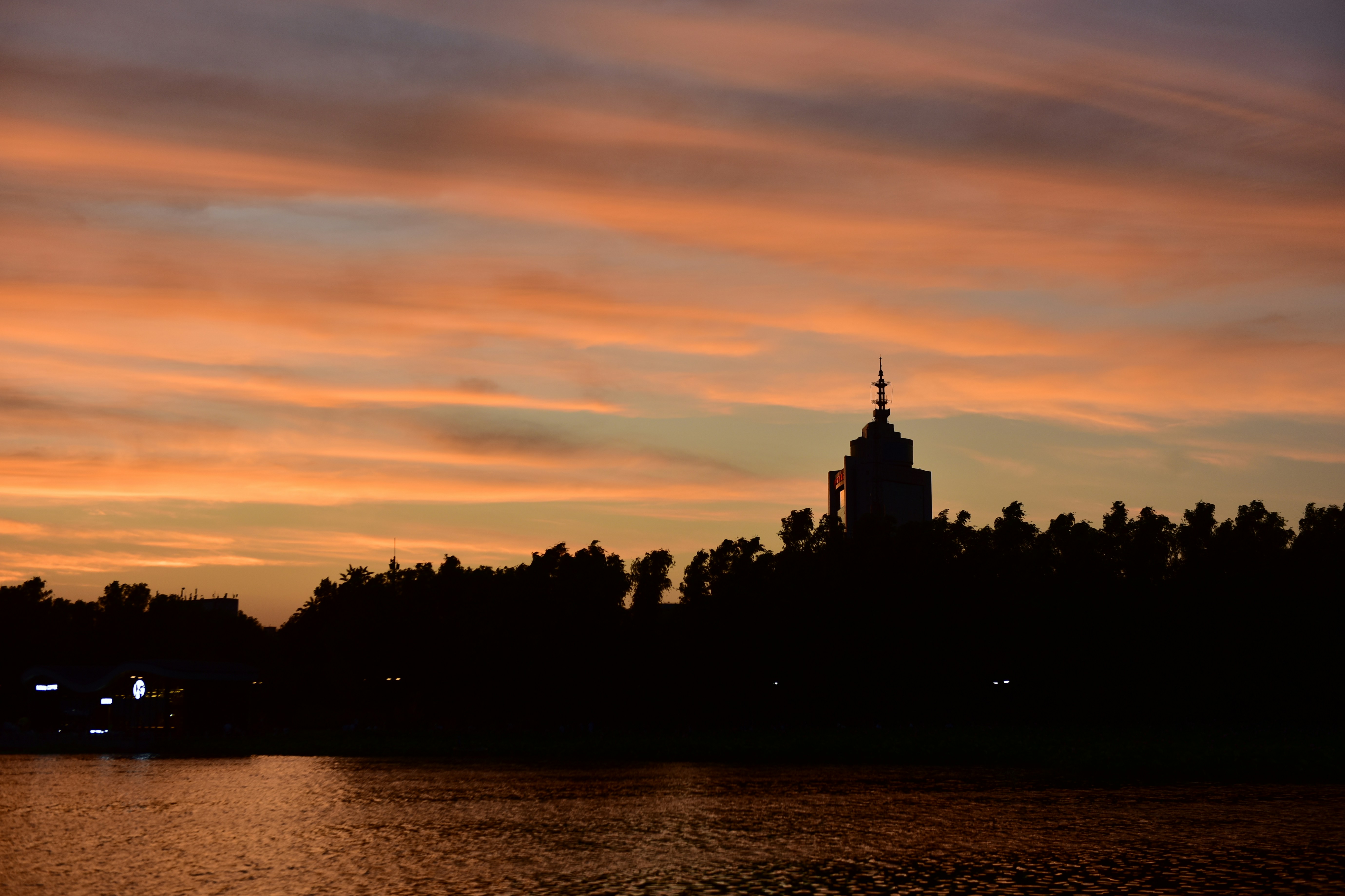Silhouette of a Towered Skyline at Sunset
