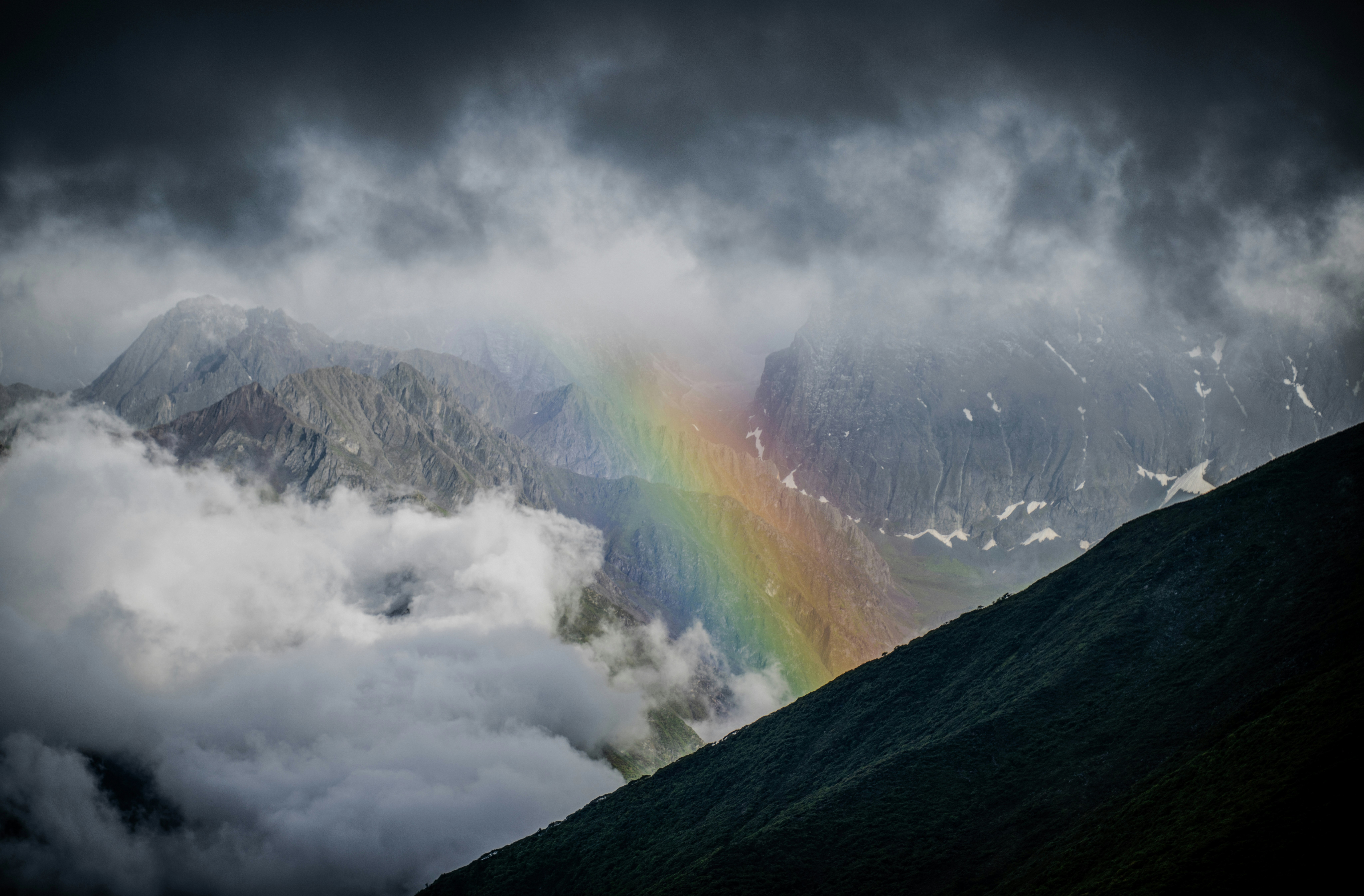 Rainbow Crest Over Alpine Slopes