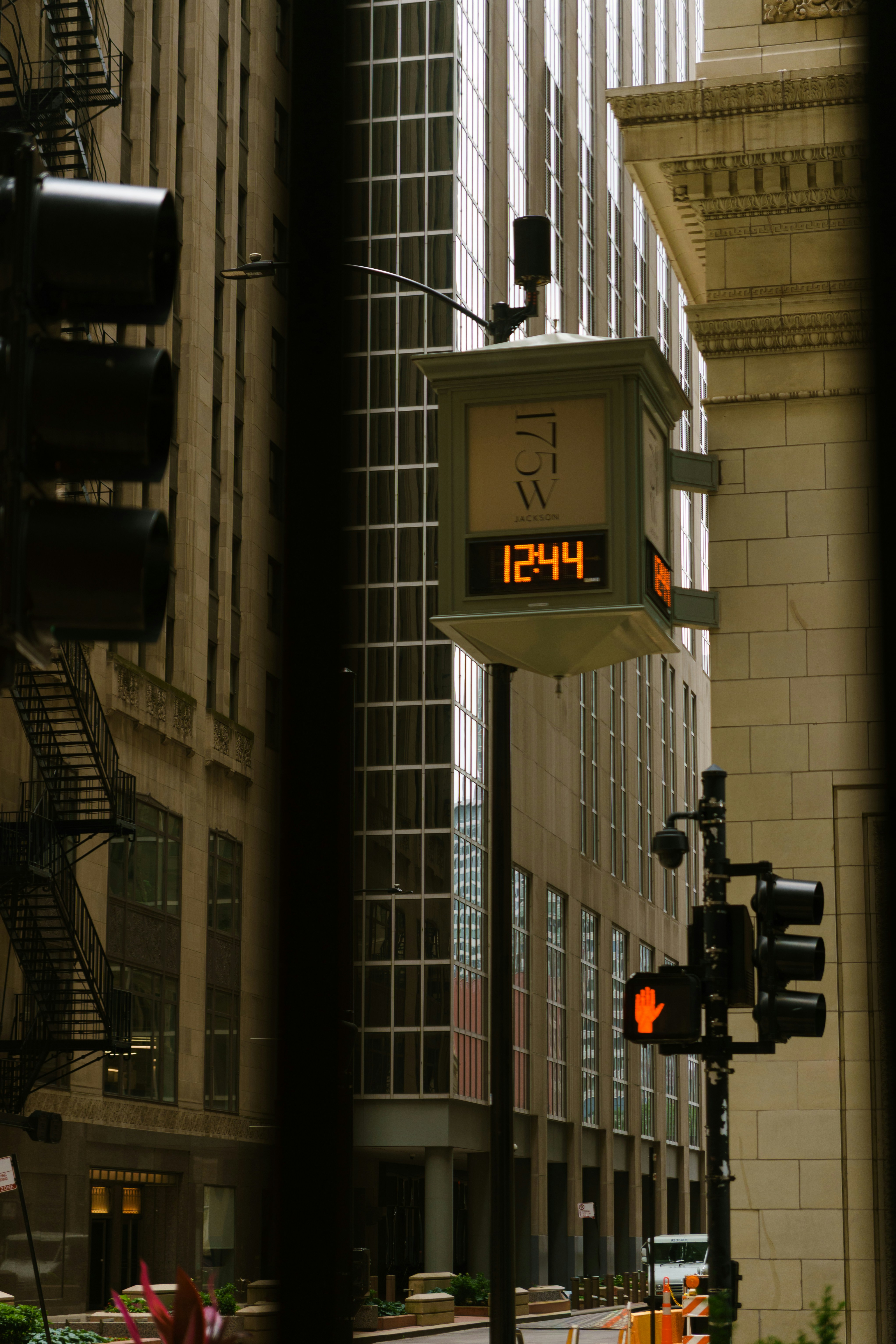 City Clock: Neon Hours Above the Street Canyon