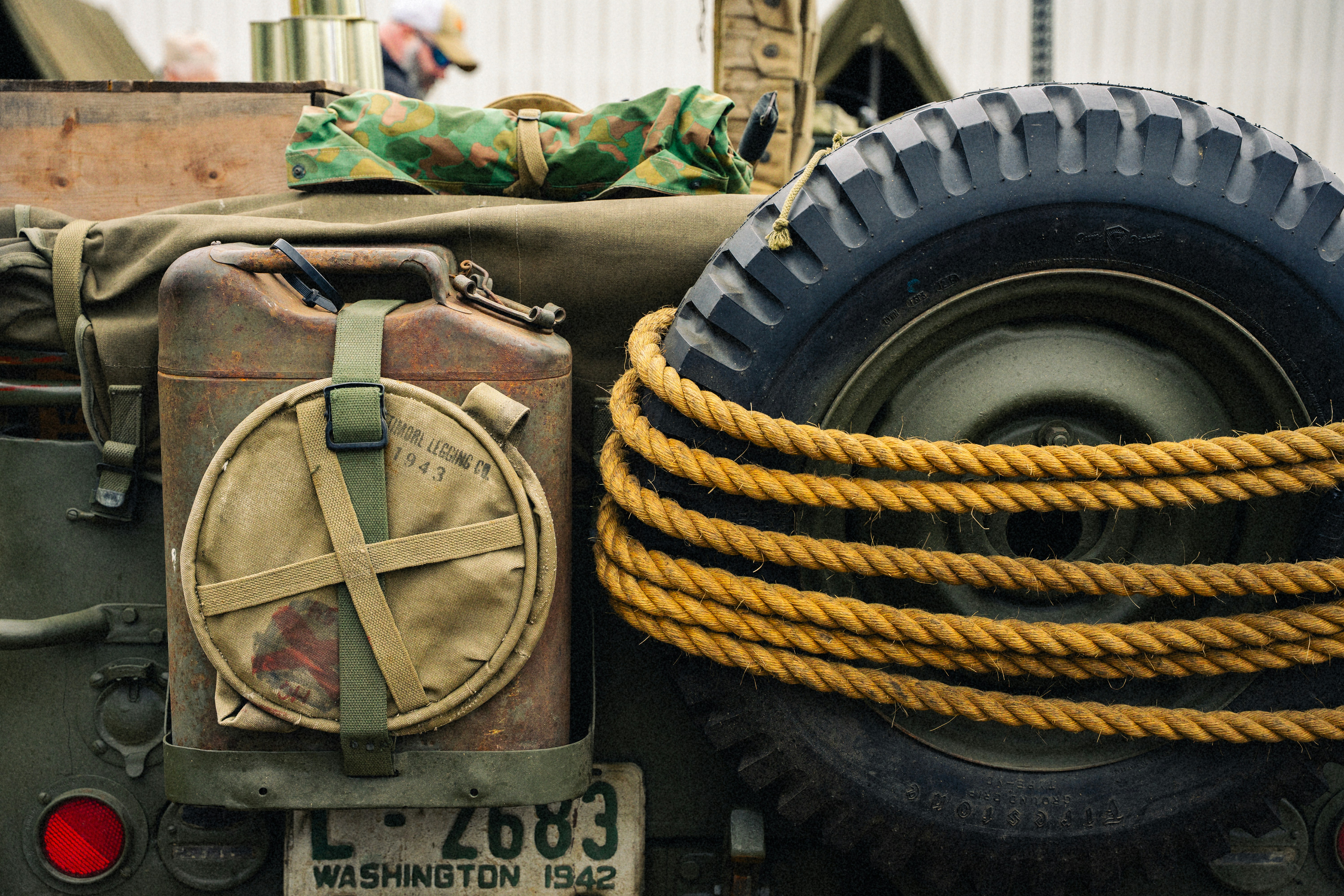 Rugged Utility: Vintage Gear and Coiled Rope on a Weathered Trailer