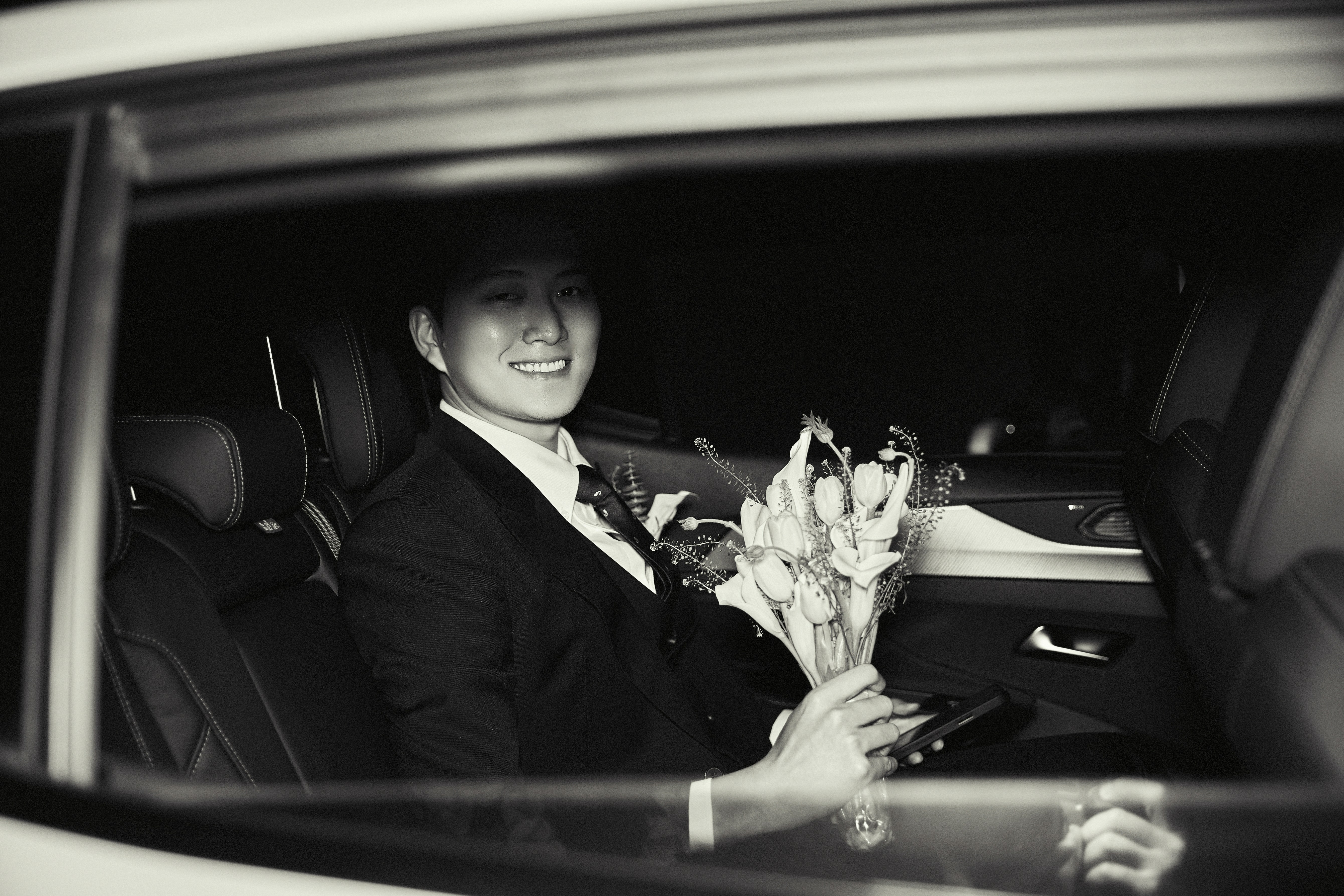 Bride in the Car: Quiet Joy with Bouquet