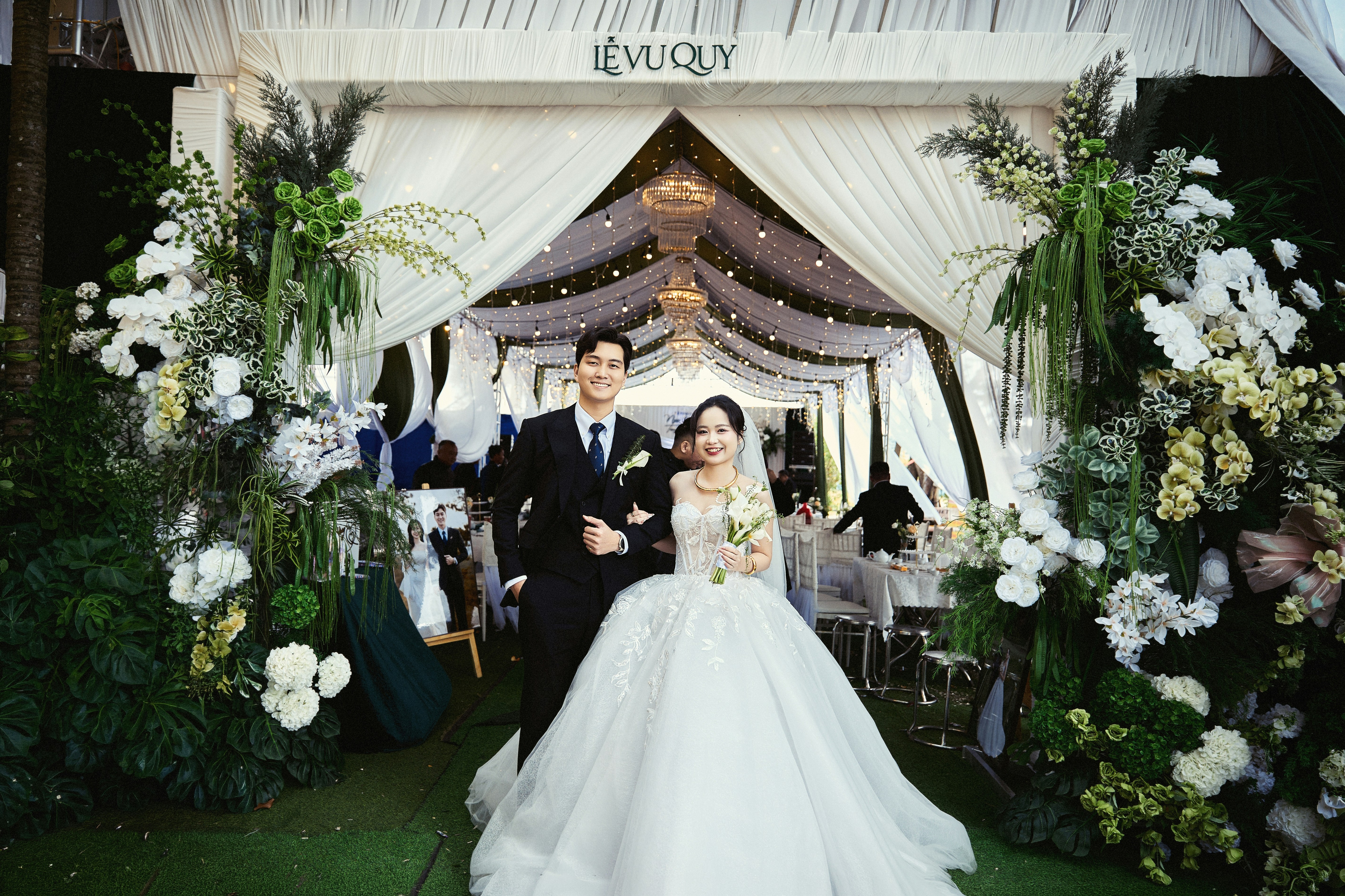 A Newlywed Parade Down a Floral Avenue