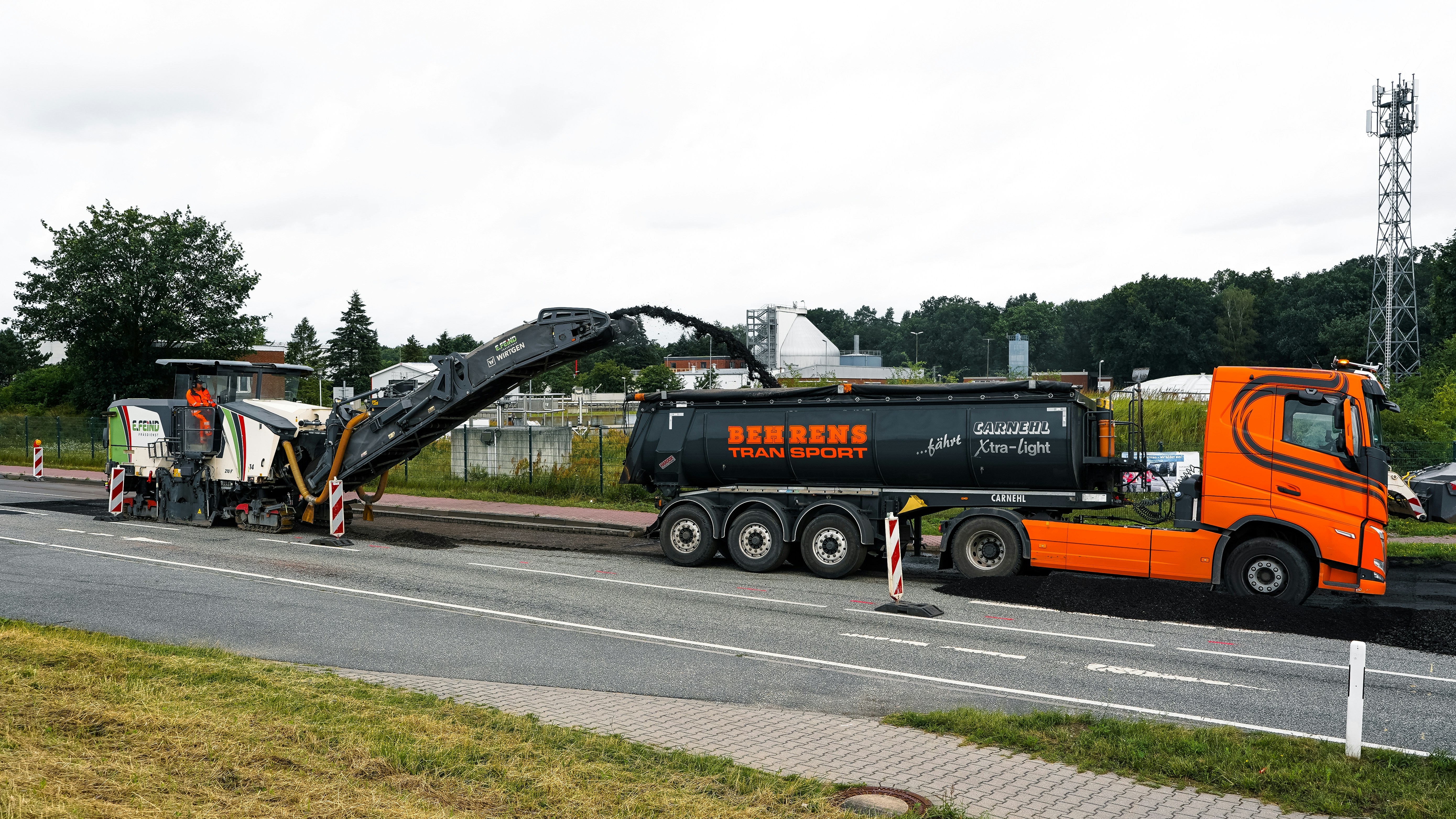 Tow-Truck Relay: Heavy Machinery and Trailing Crane at Roadside