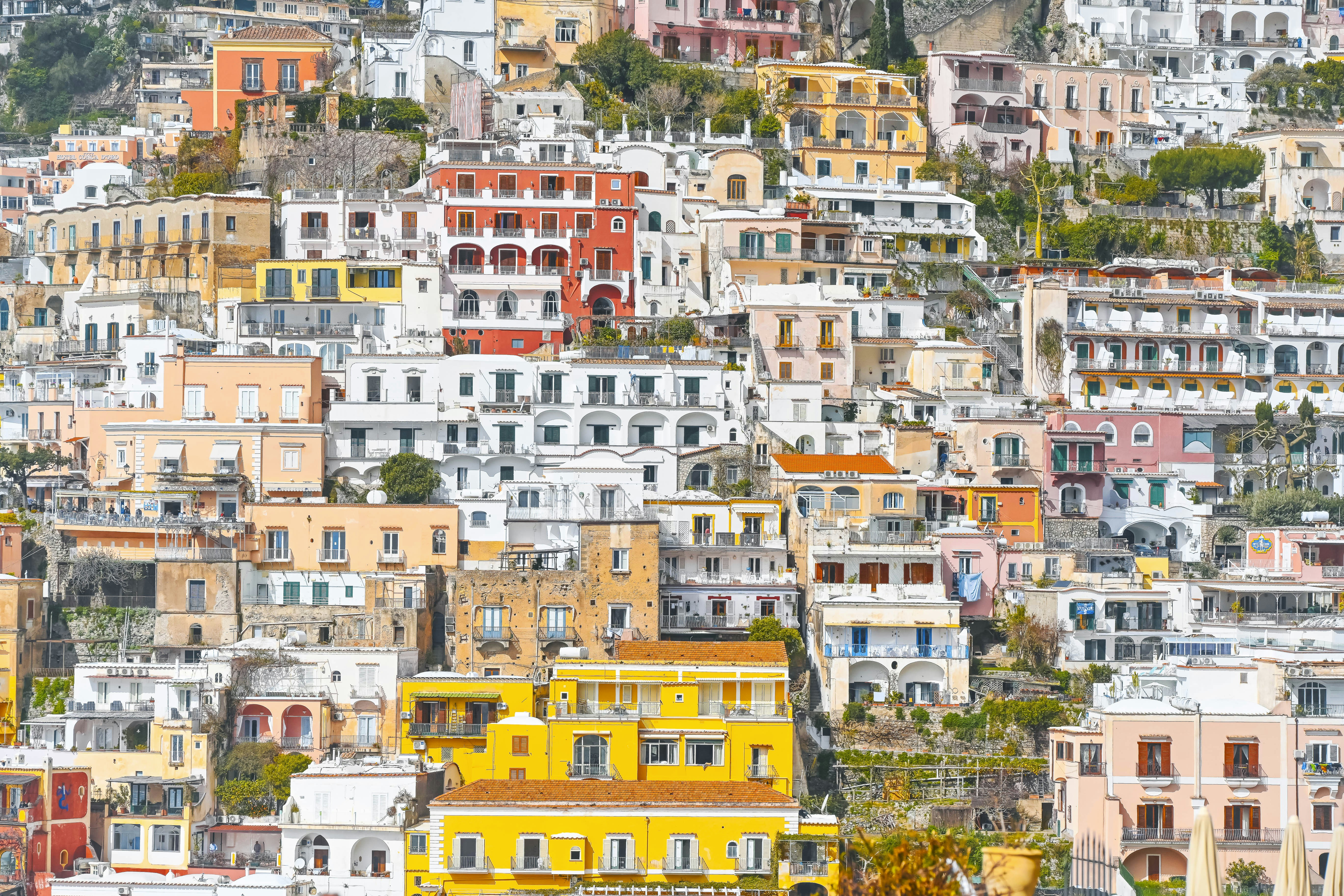 Colorful hillside village mosaic
