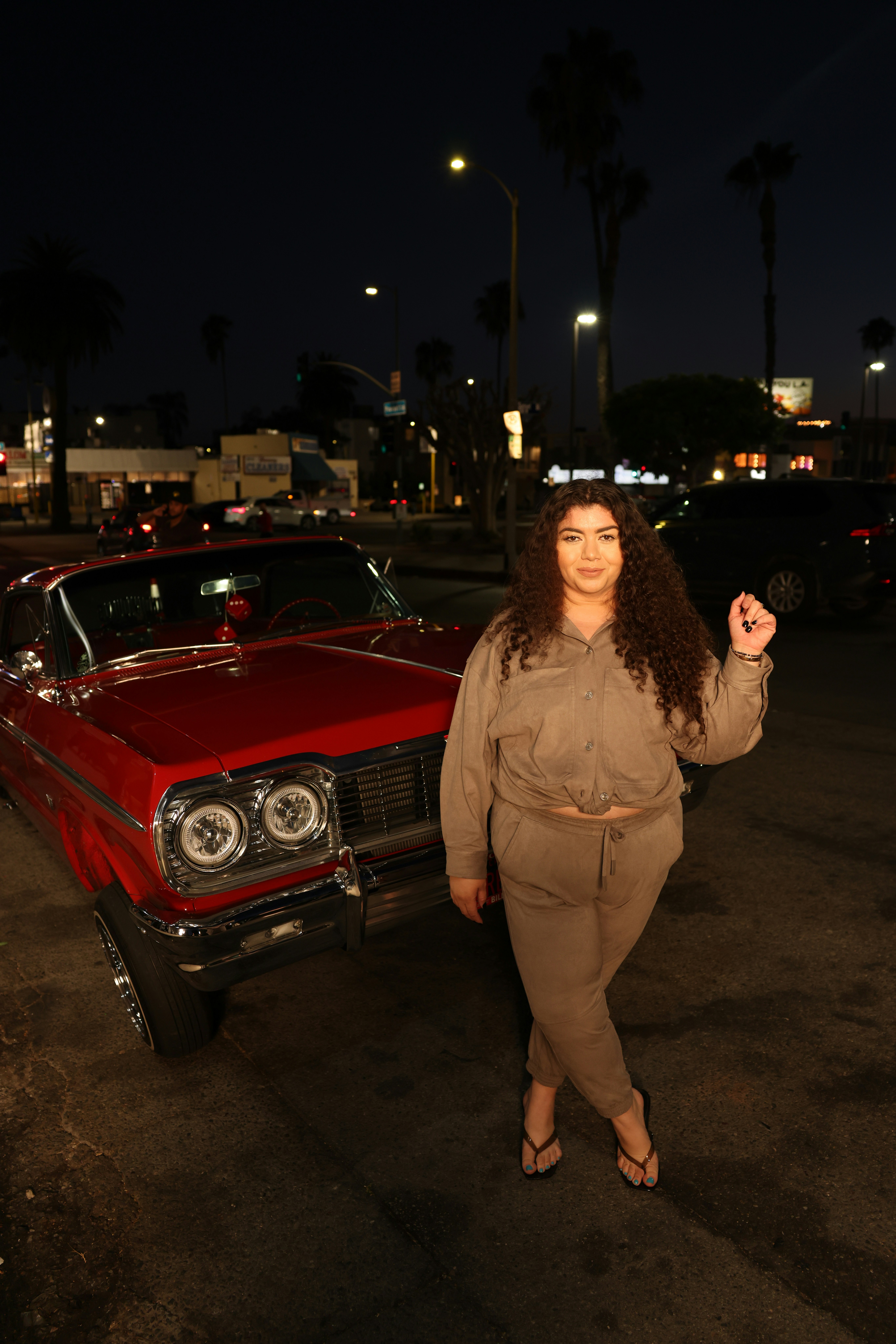 Night Street Portrait by a Classic Red Car