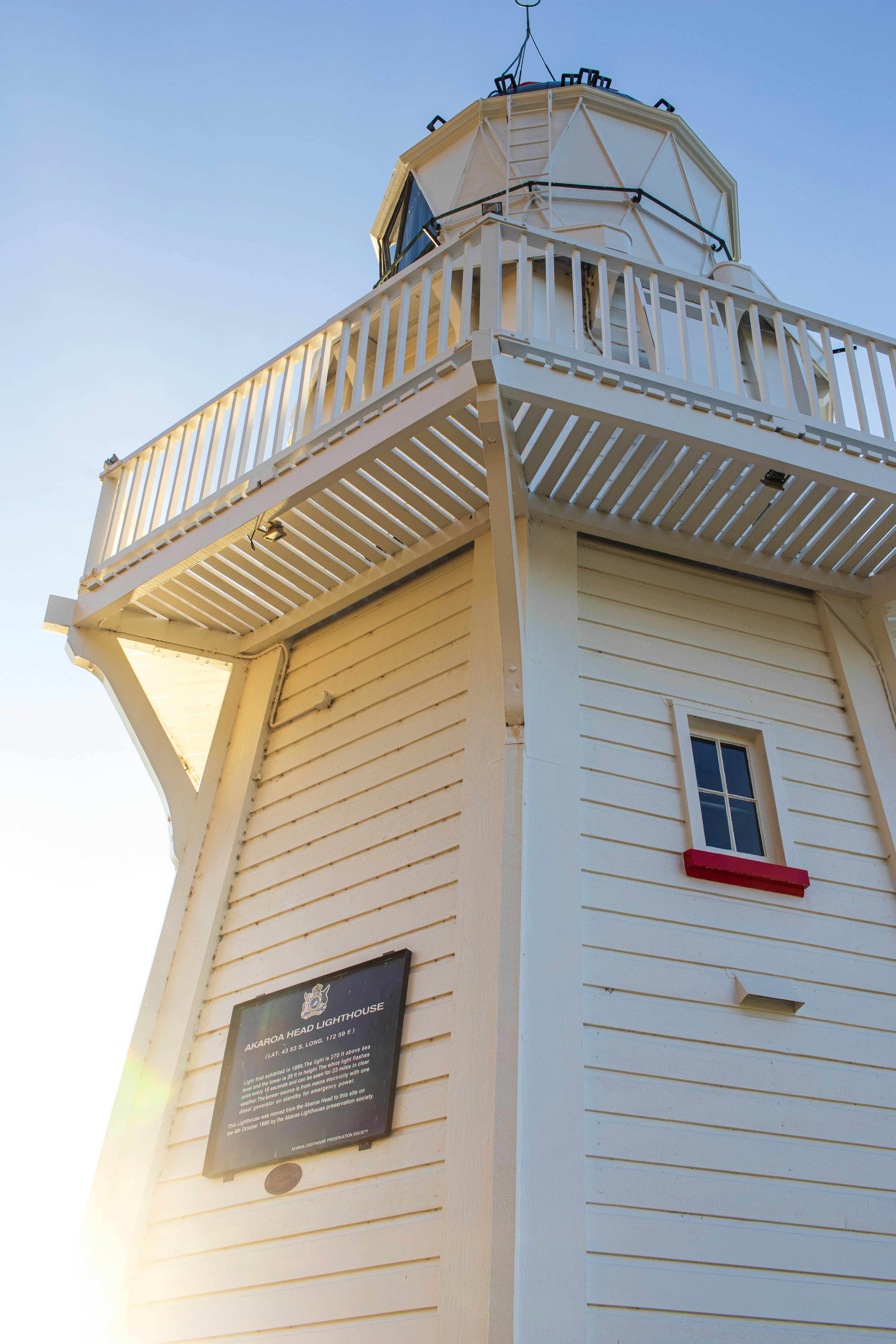 Lighthouse Beacon: A Coastal Outpost Standing Against the Clear Sky