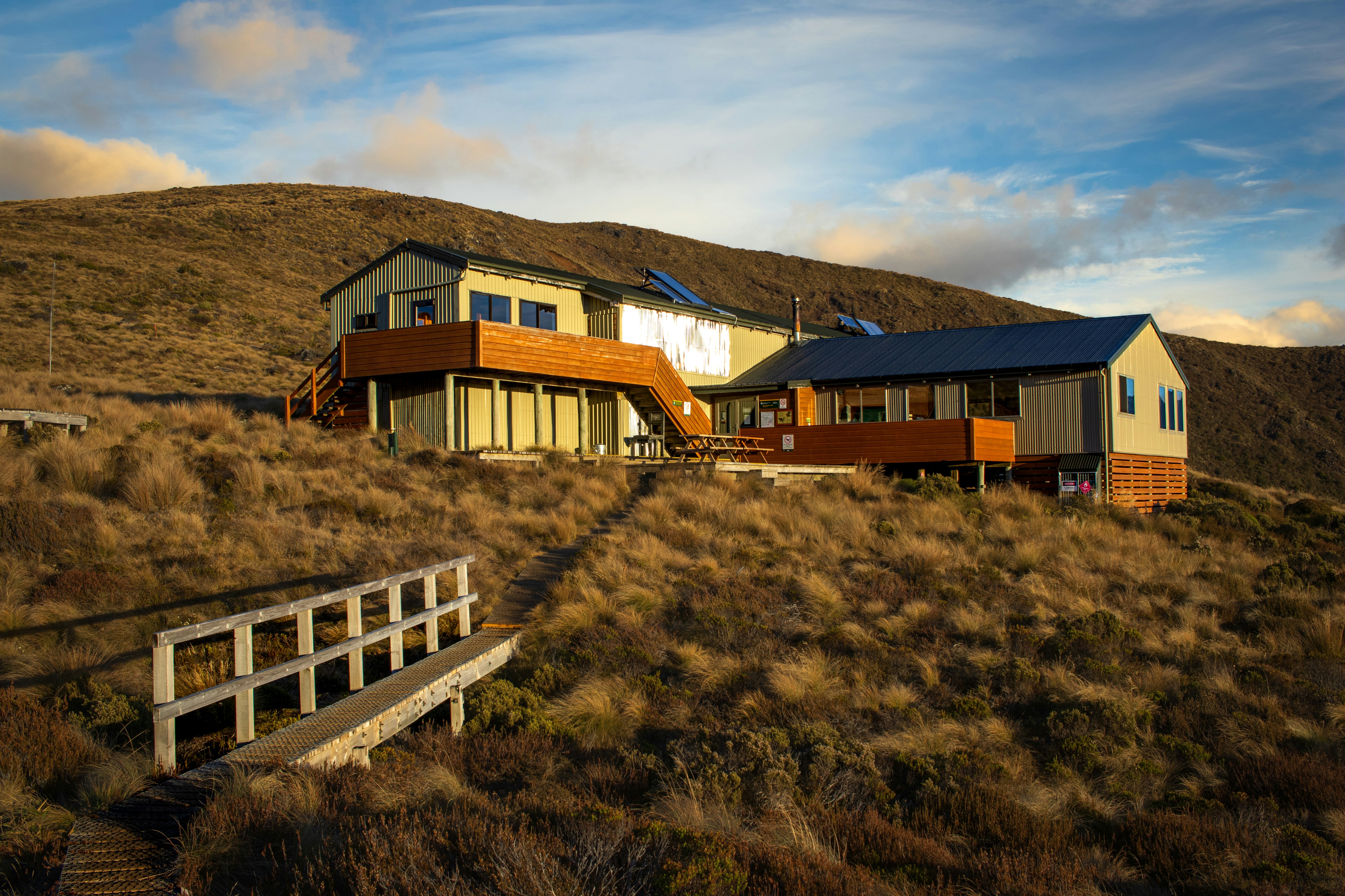 Hearth on the Hills: A Wind-Swept Cabin at Golden Hour