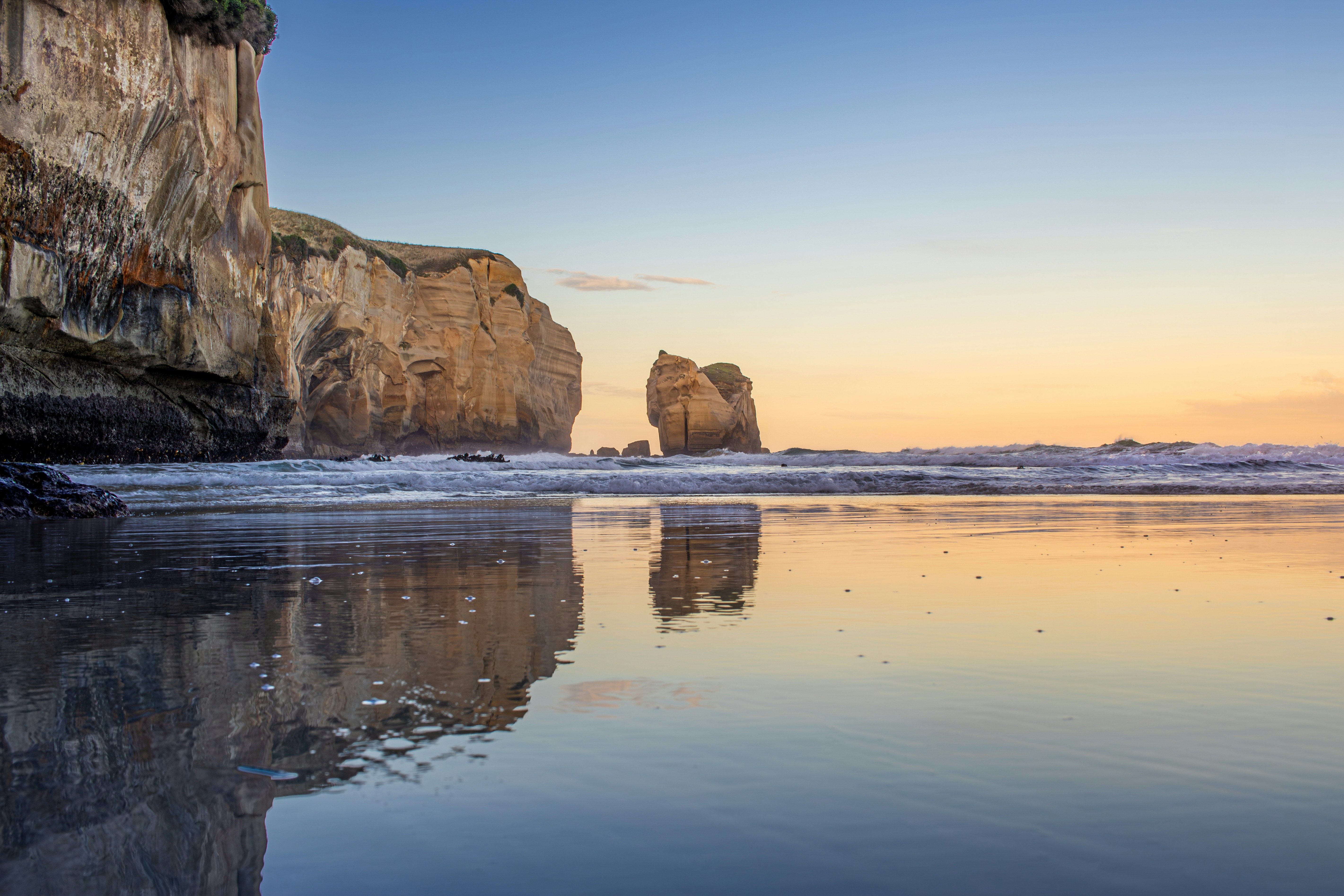 Rock Gate at Sunset: Reflections on a Quiet Tidal Shore