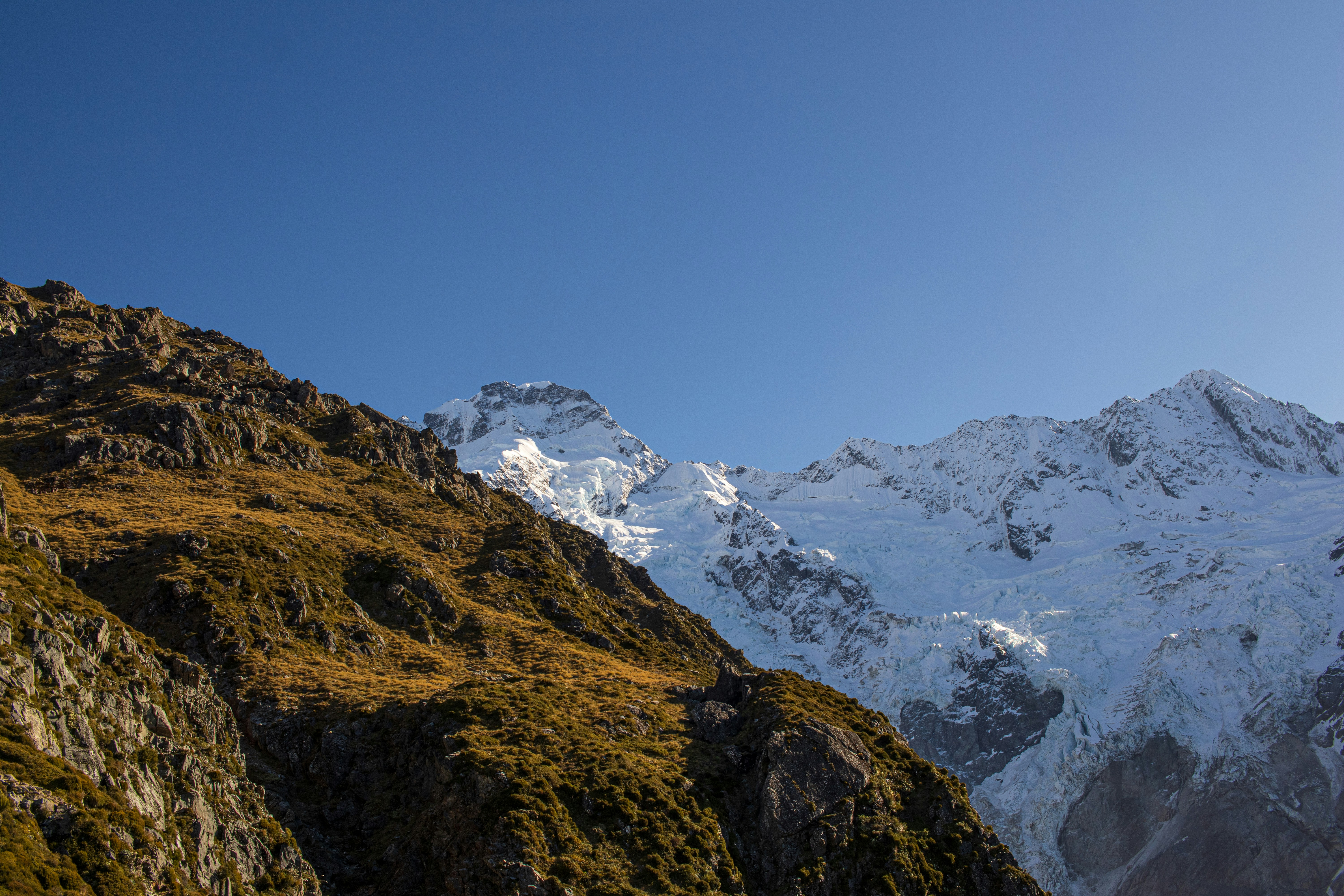 Sunlit Summit Above the Alpine Ridge